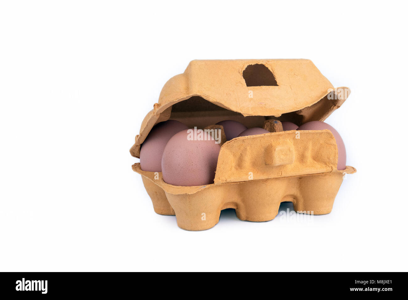 chicken eggs in box on white background Stock Photo - Alamy