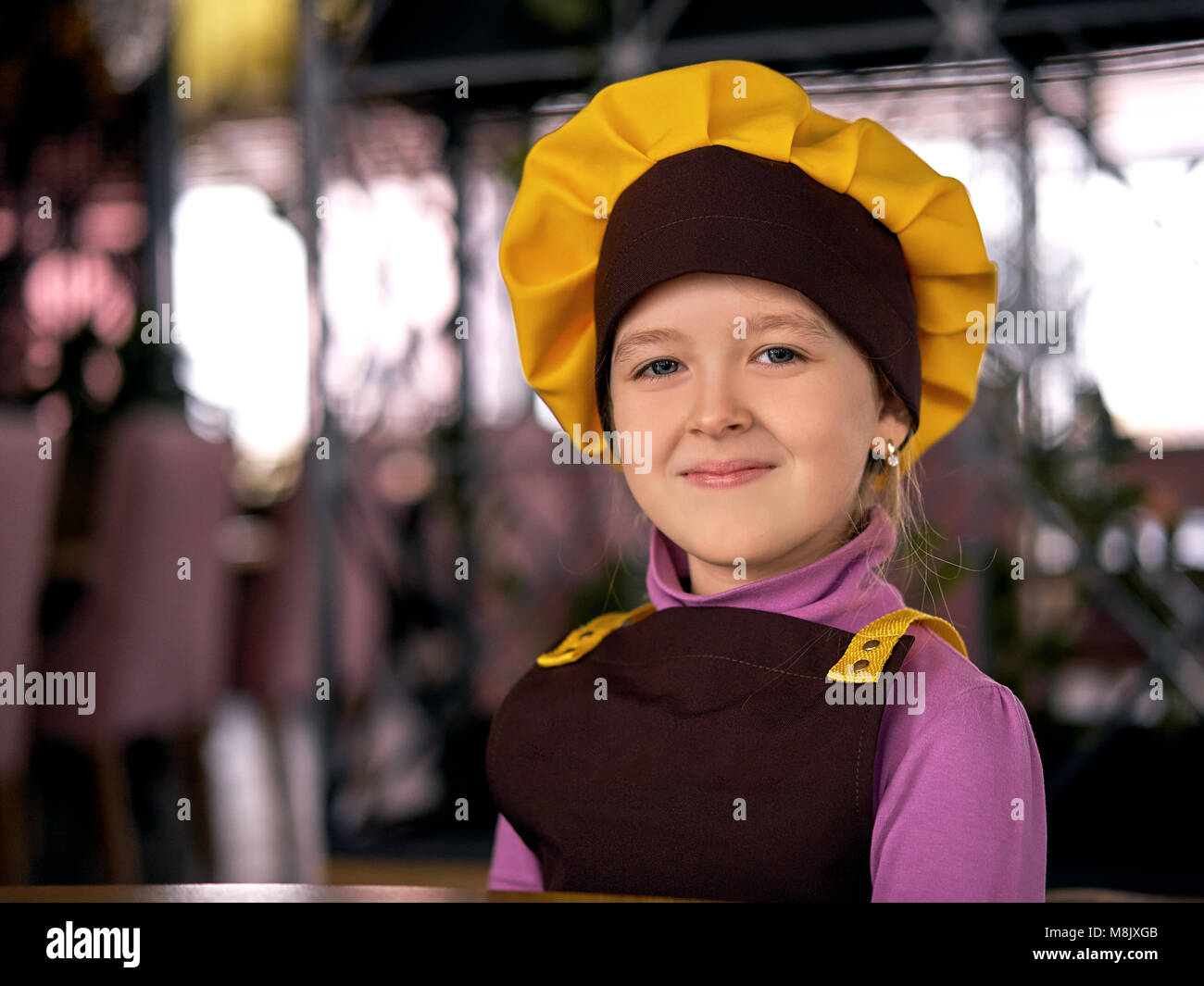 girl in the hood chef restaurant Stock Photo - Alamy