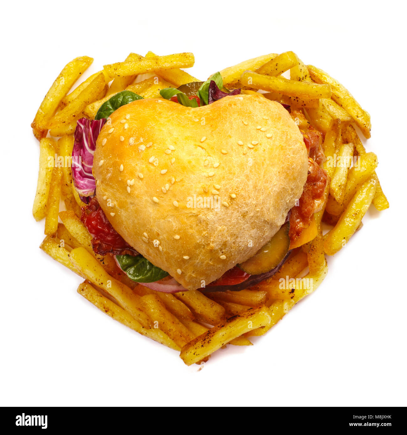 Heart shaped hamburger and french fries, love burger fast food concept ...