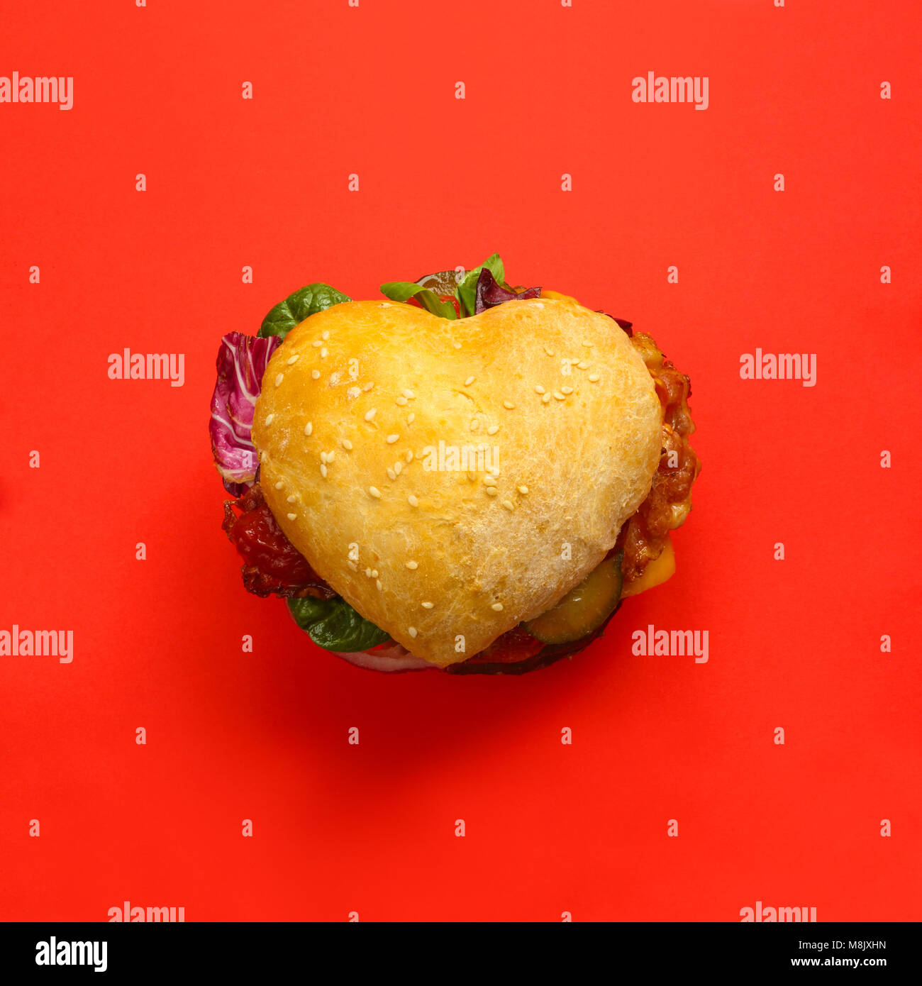 Heart beef burger on bun hi-res stock photography and images - Alamy