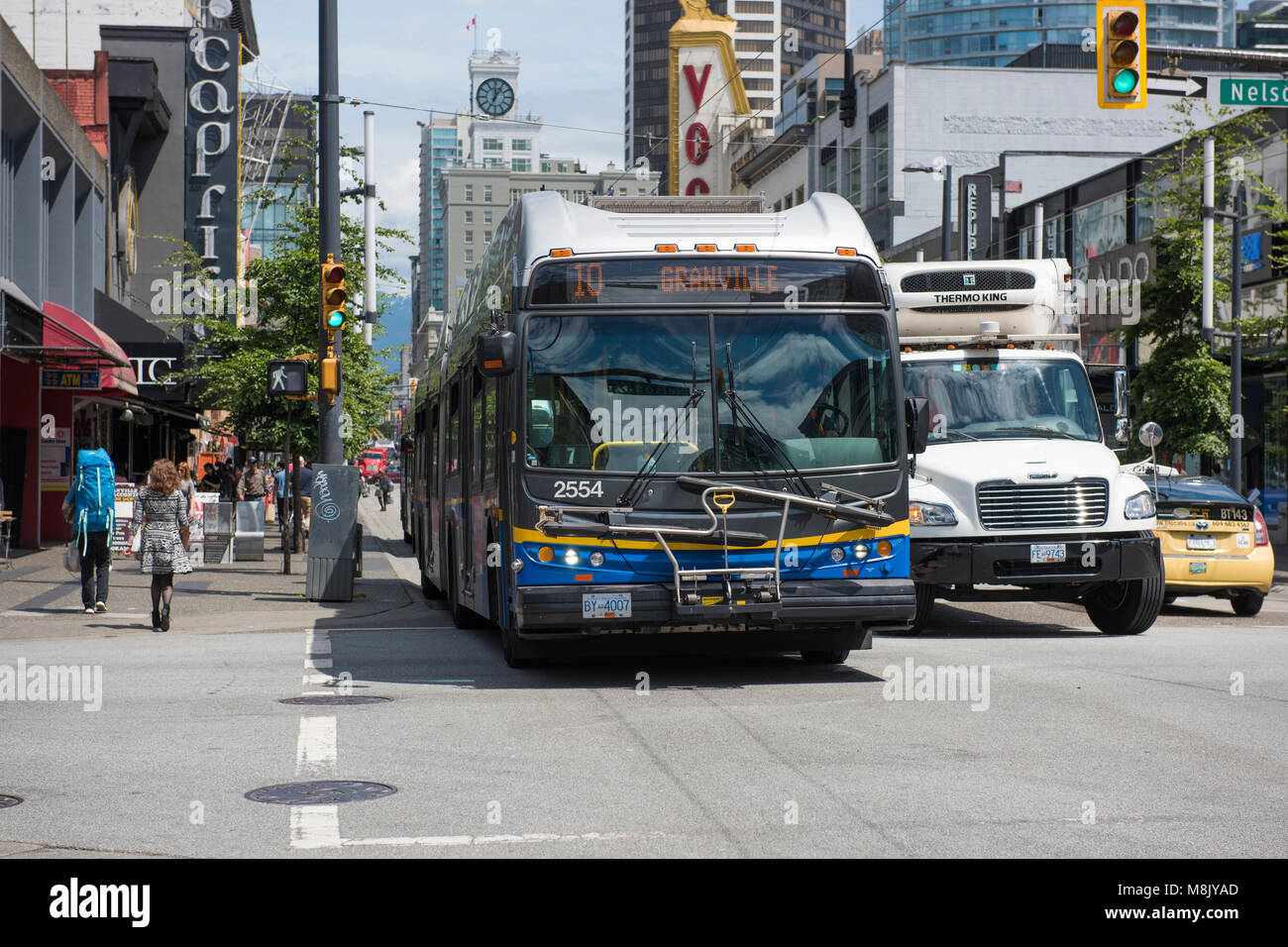 Vancouver City transit buses running their routes along Granville ...