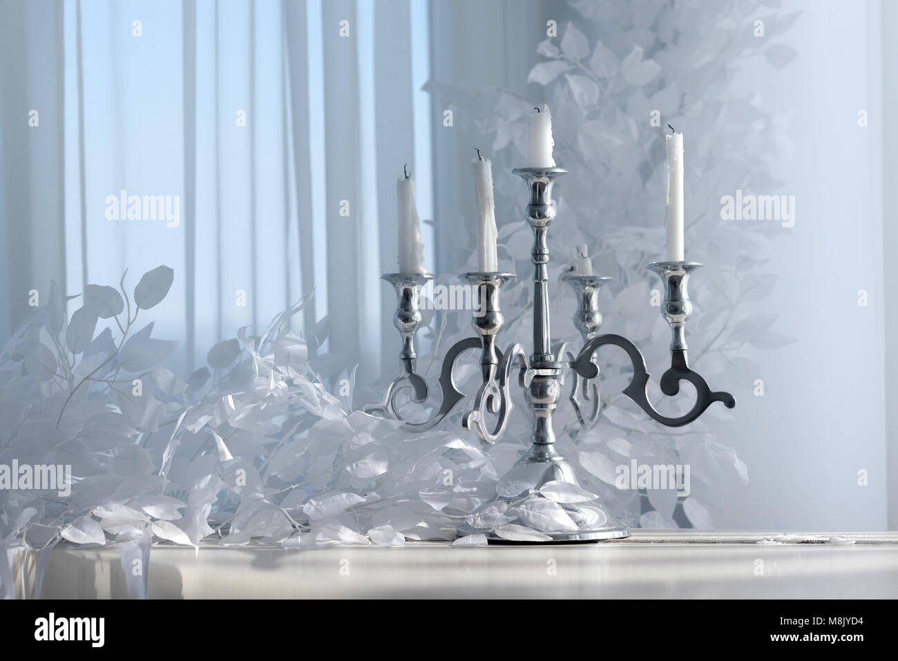 Old candle vintage silver candlestick Stock Photo - Alamy