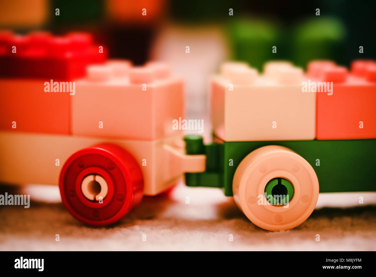 Plastic toy cars made of building blocks Stock Photo - Alamy