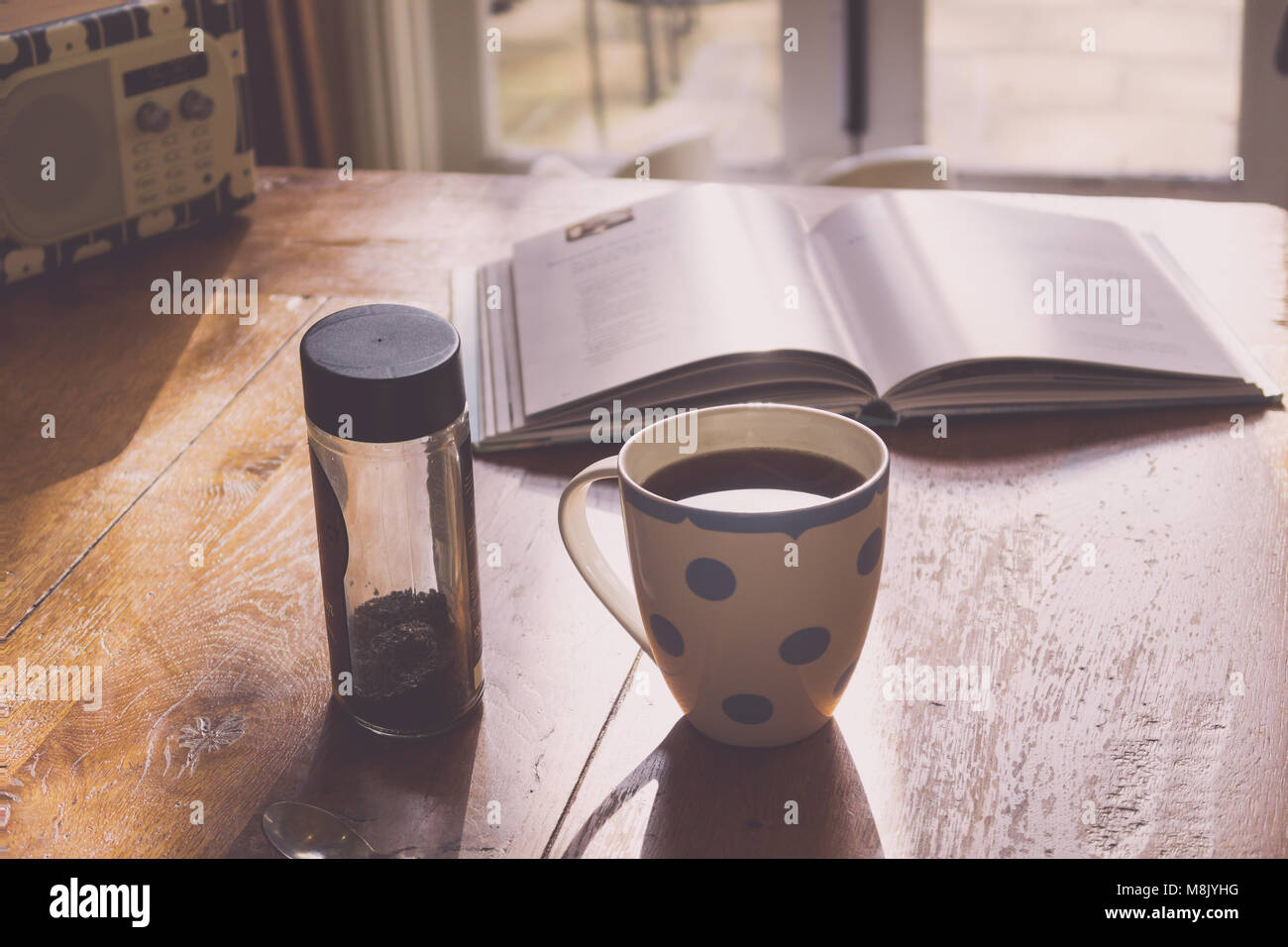 Drinking coffee in the kitchen Stock Photo - Alamy