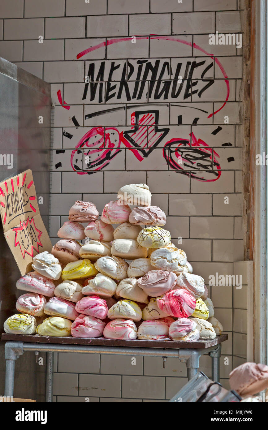 Stack of colorful meringues on display in a sweet shop in Amsterdam ...