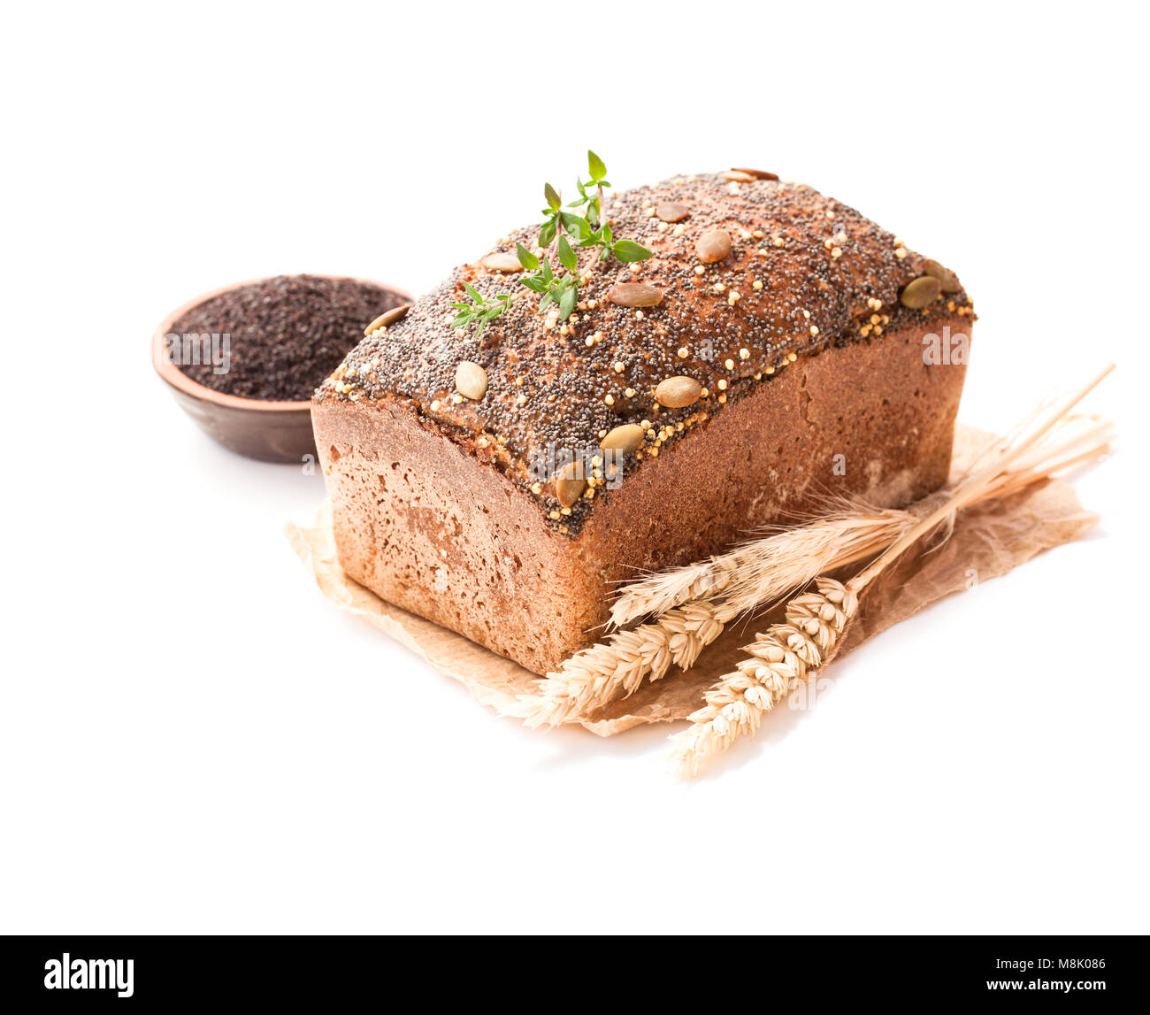 Homemade wholemeal rye bread with poppy seeds isolated on white Stock ...