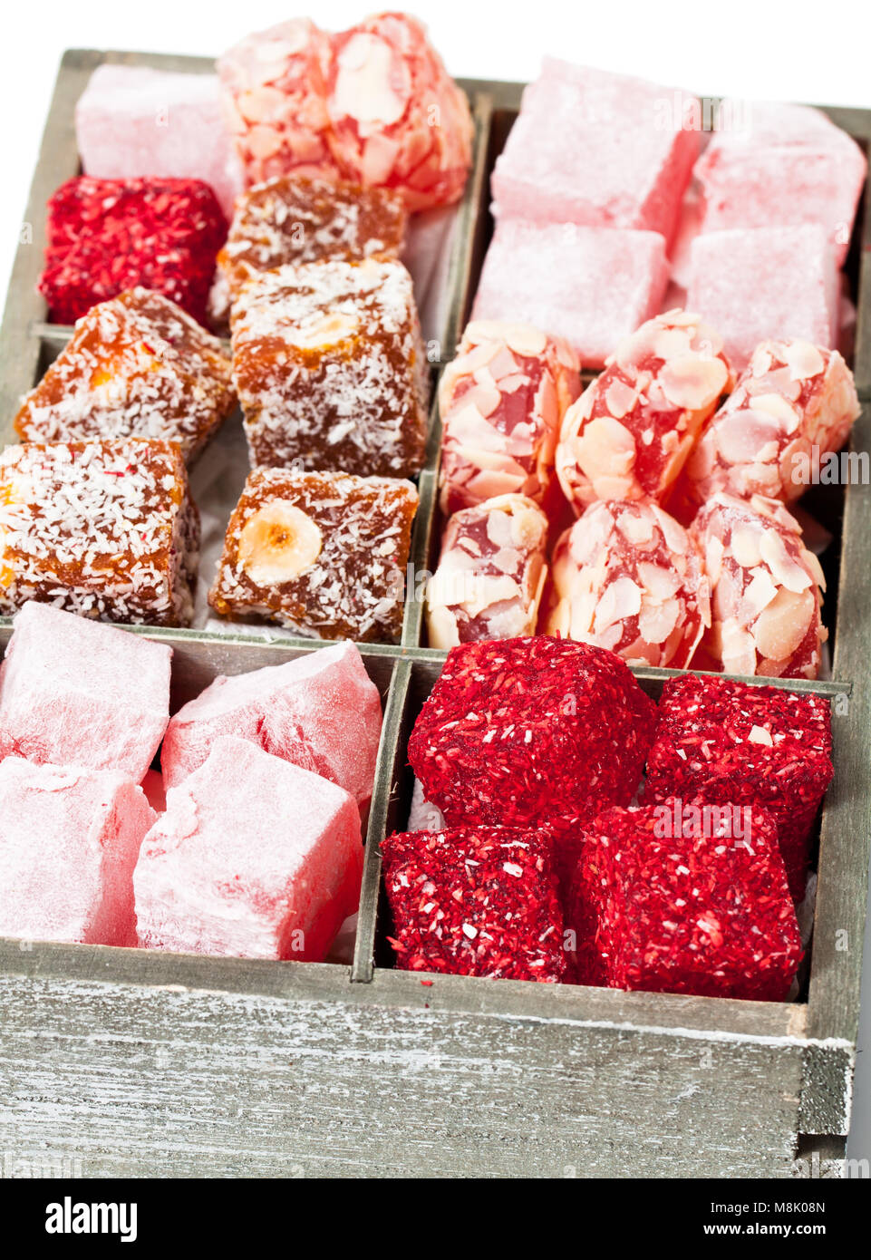 Assortment turkish delight in wooden box isolated on white Stock Photo ...