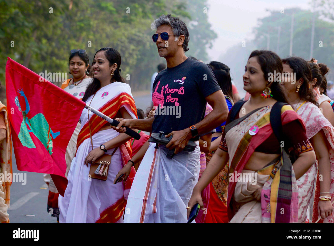 Kolkata, India. 18th Mar, 2018. Model and Actor Milind Soman (in middle ...