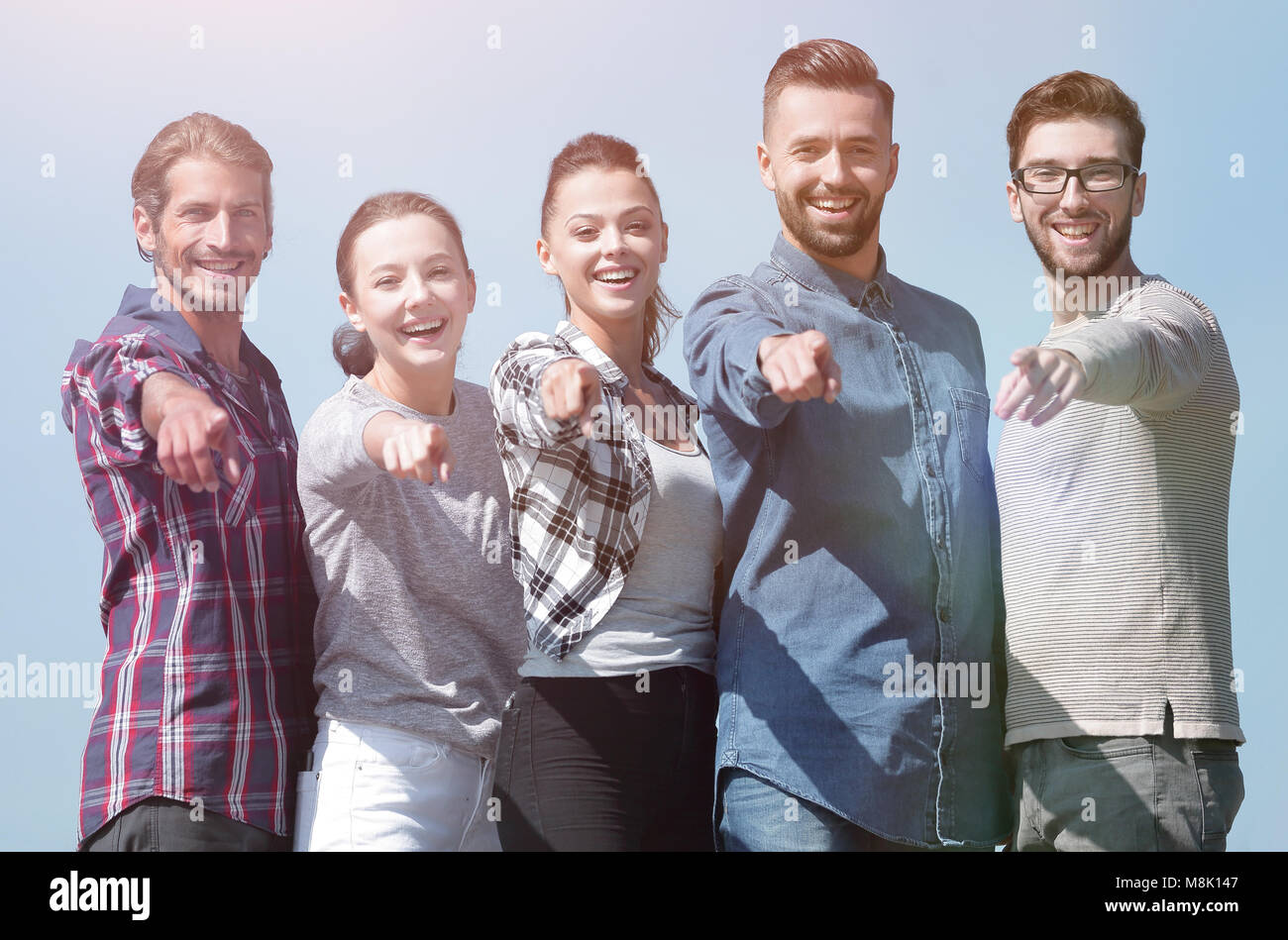 team of young people showing hands forward Stock Photo - Alamy