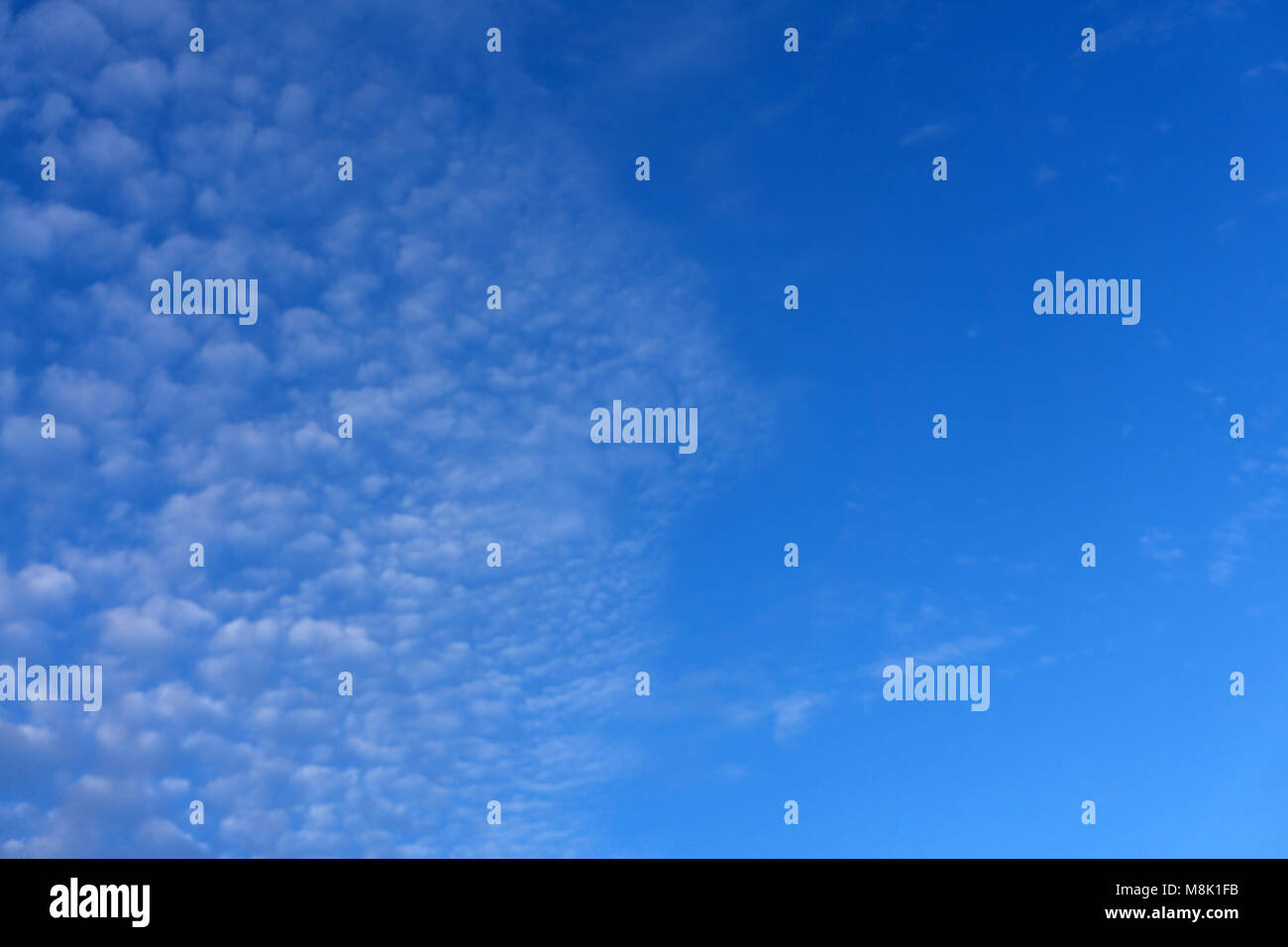 The clouds scatter in the sky blue pattern Stock Photo - Alamy