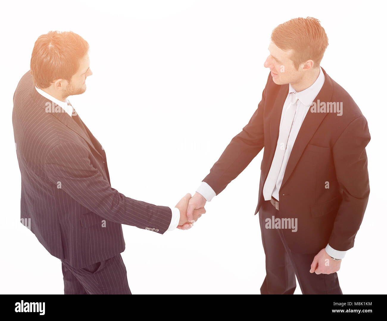 in full growth.handshake, business partners ,isolated on white ...