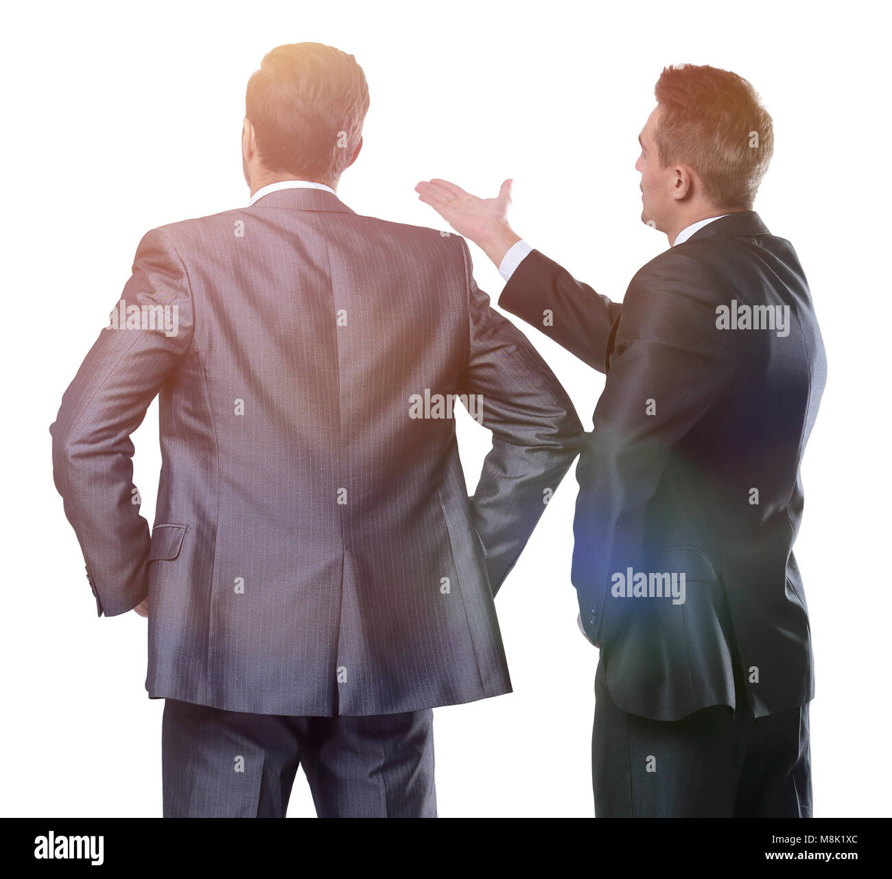 rear view of two businessmen pointing forward Stock Photo - Alamy