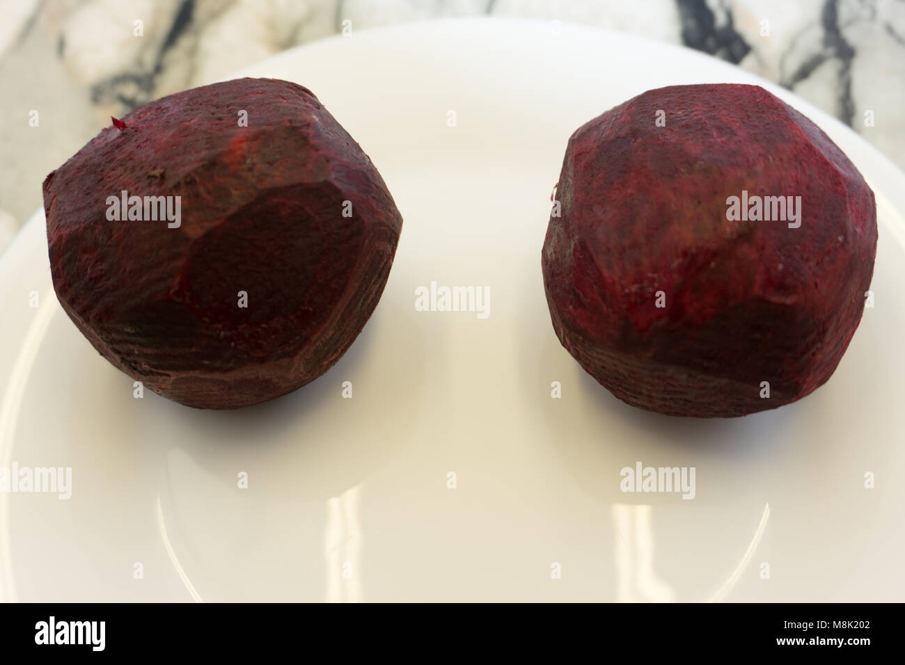 beetroot peeled on white background Stock Photo - Alamy