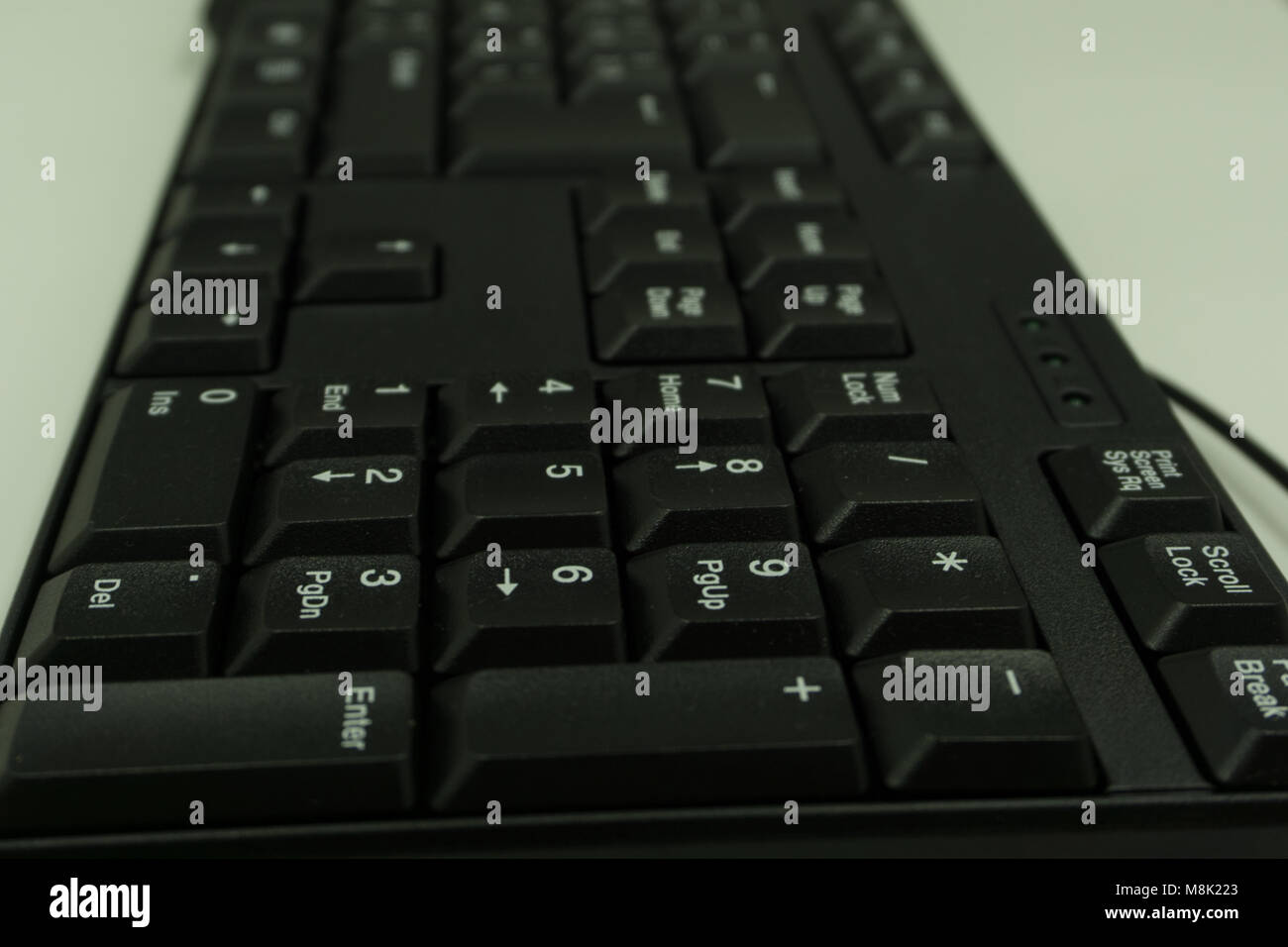 Office desk table with keyboard black with hand Top view on white ...