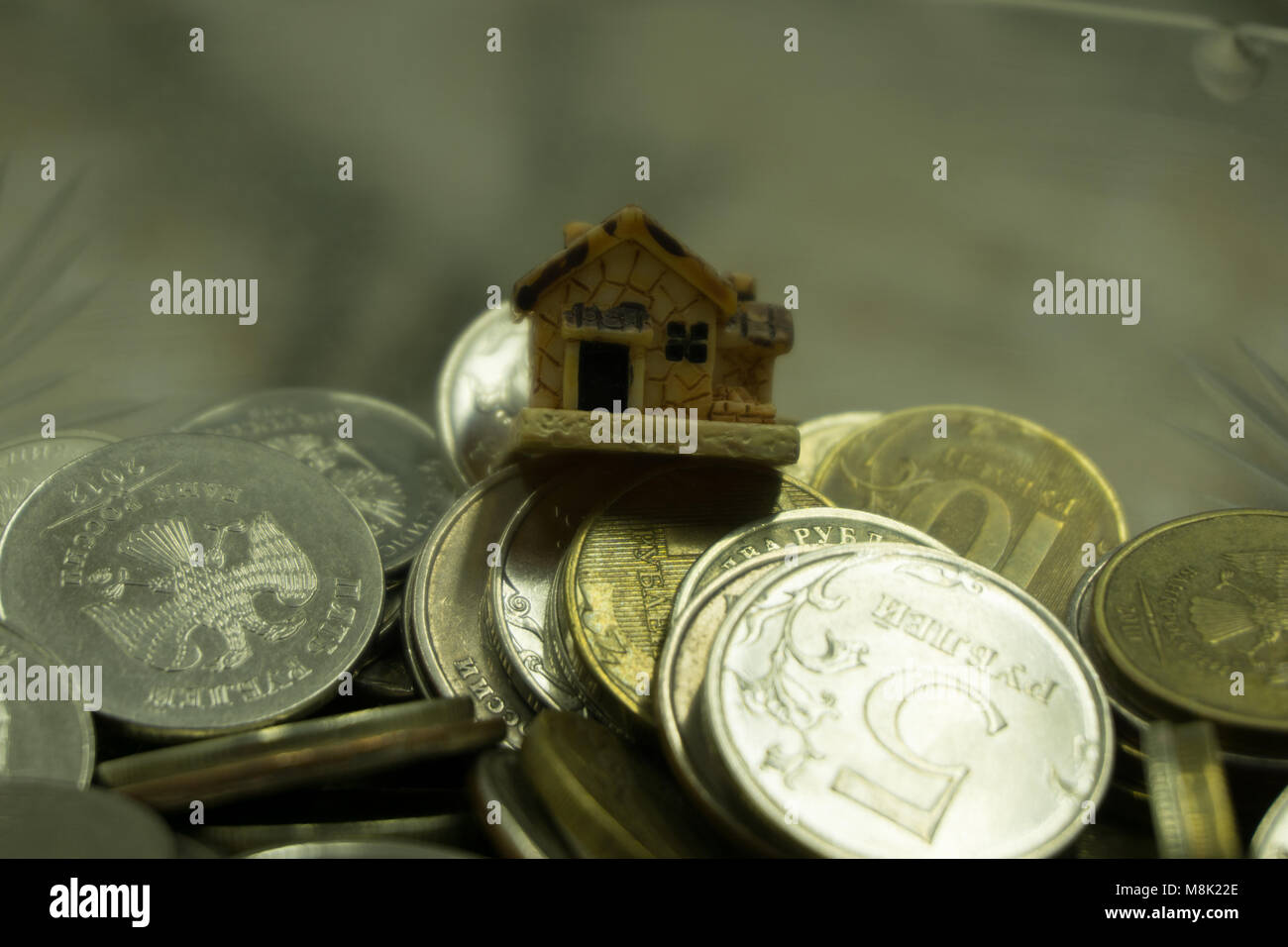 Russian coins are stacked columns and covered with a wooden roof from ...