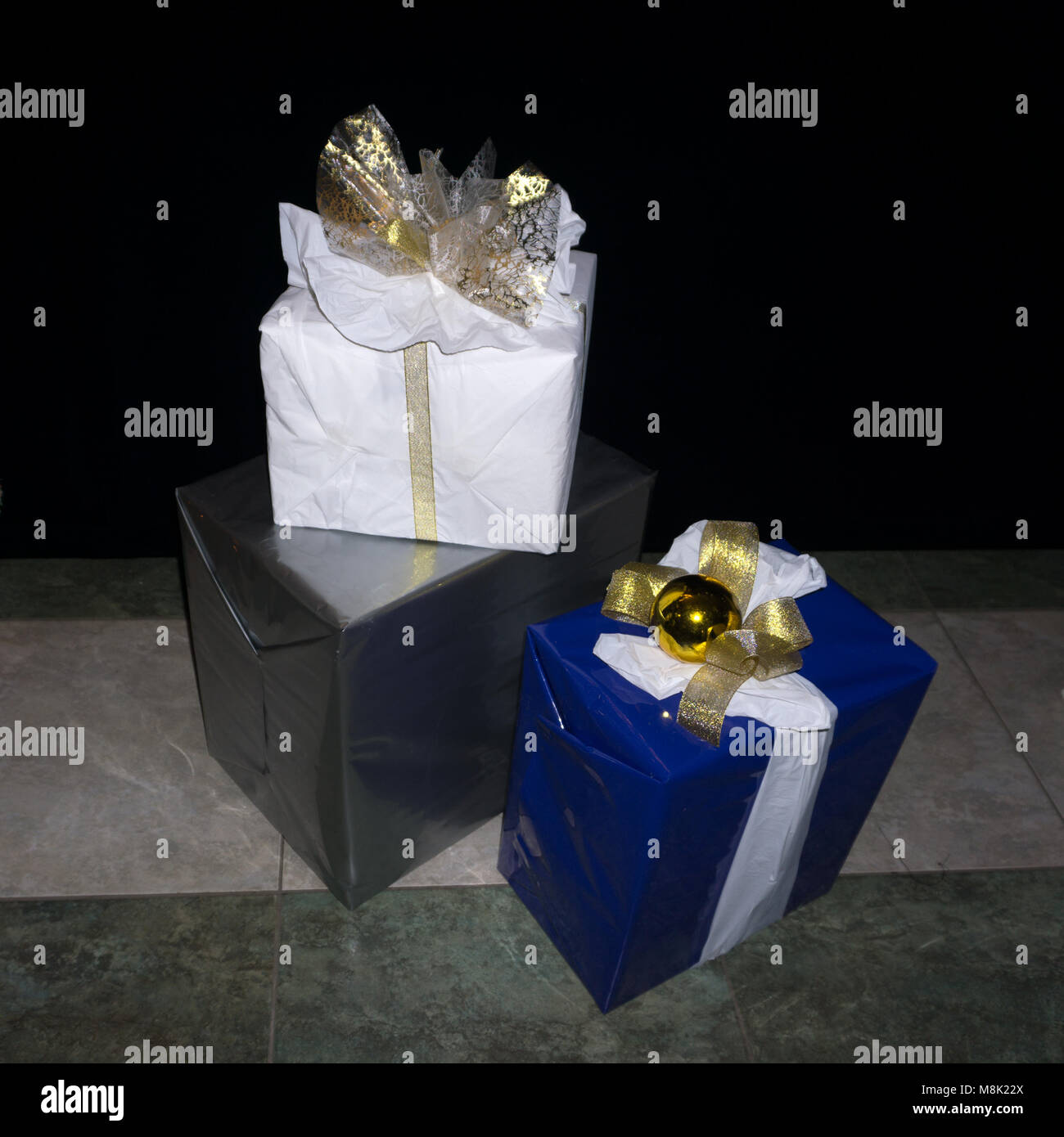 Three gifts are beautifully issued Stock Photo - Alamy