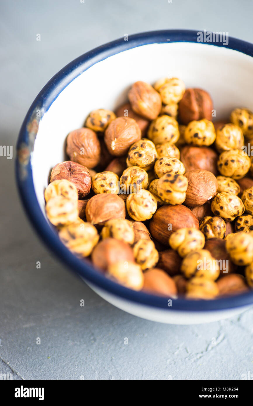 Different types of nuts in a bowl as a snack food concept Stock Photo ...