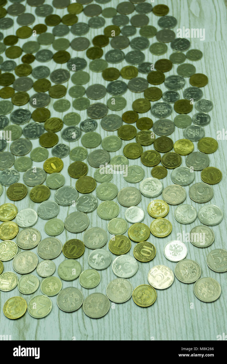 colorful shiny coins in sunlight Stock Photo - Alamy