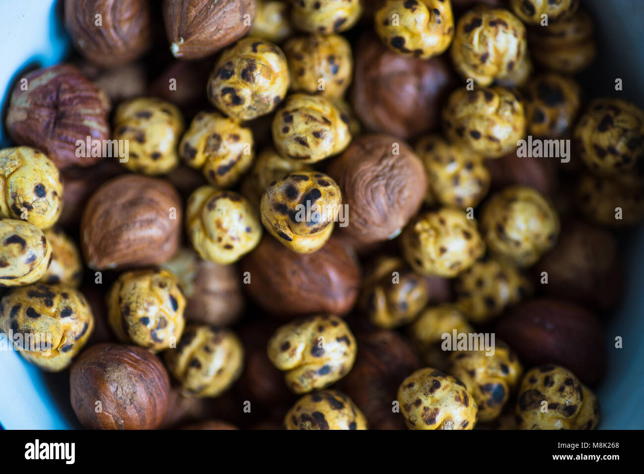 Different types of nuts in a bowl as a snack food concept Stock Photo ...