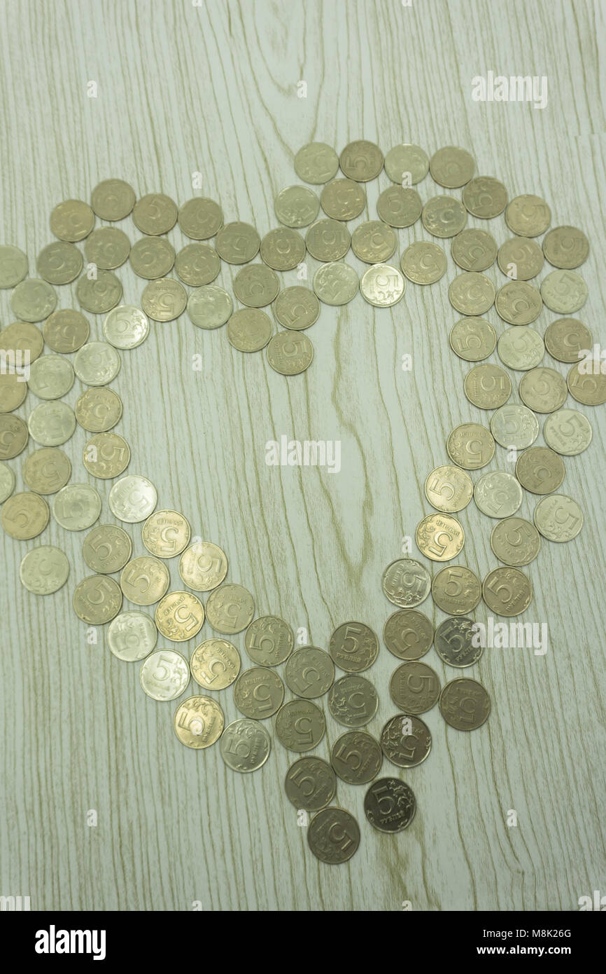 a set of eurocent coins leaving a heart shaped field empty Stock Photo ...