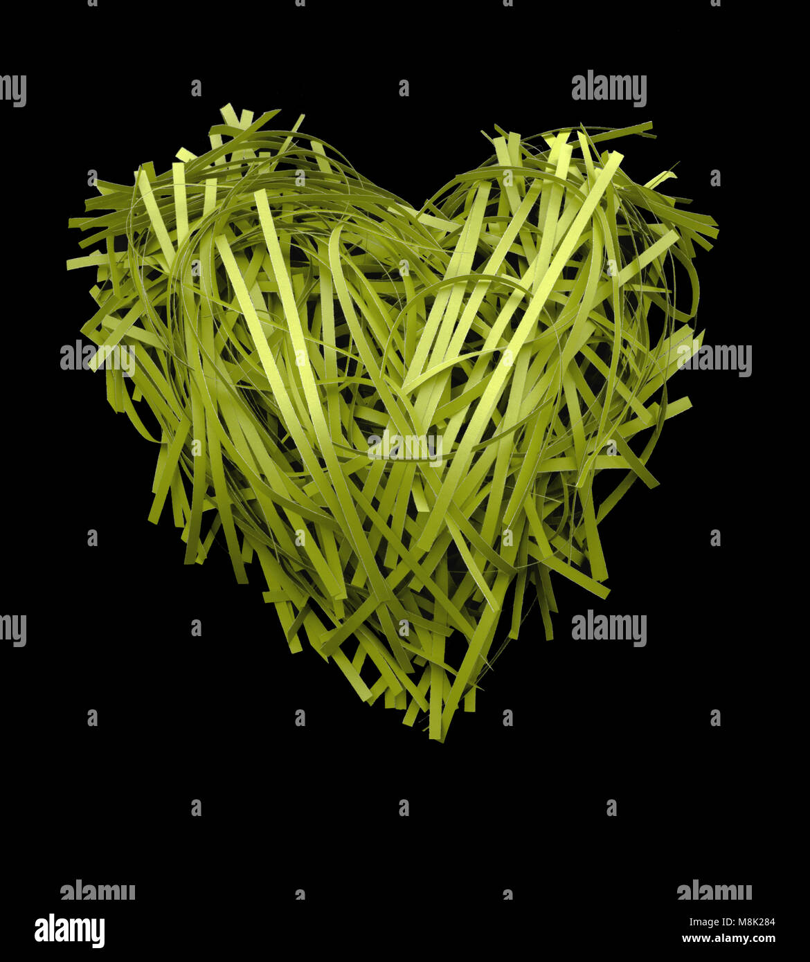 Shredded heart shape symbol on a black background Stock Photo - Alamy