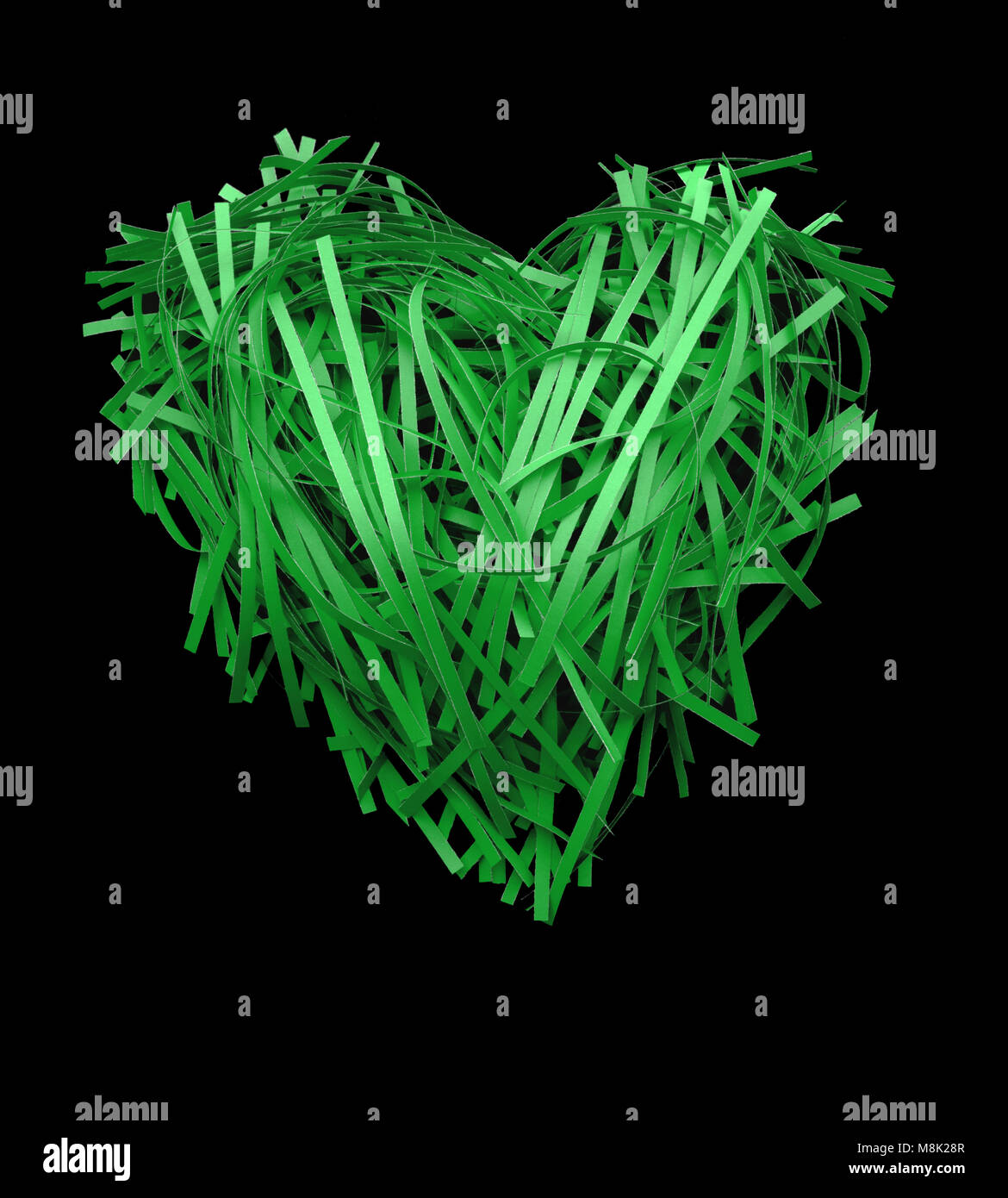 Shredded heart shape symbol on a black background Stock Photo - Alamy