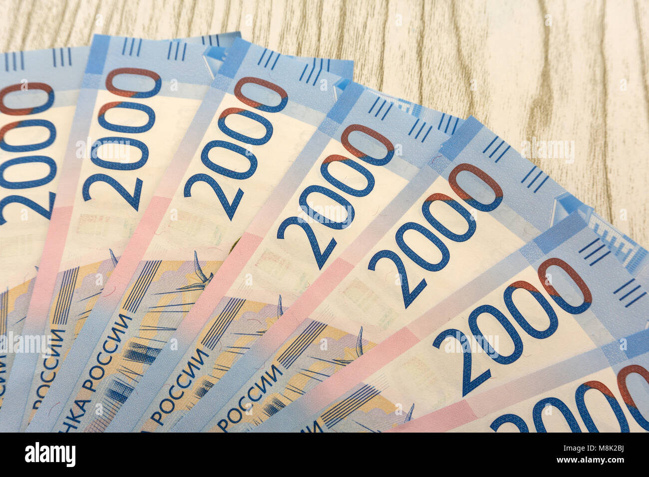 background of the new banknotes worth 2000 rubles Stock Photo - Alamy