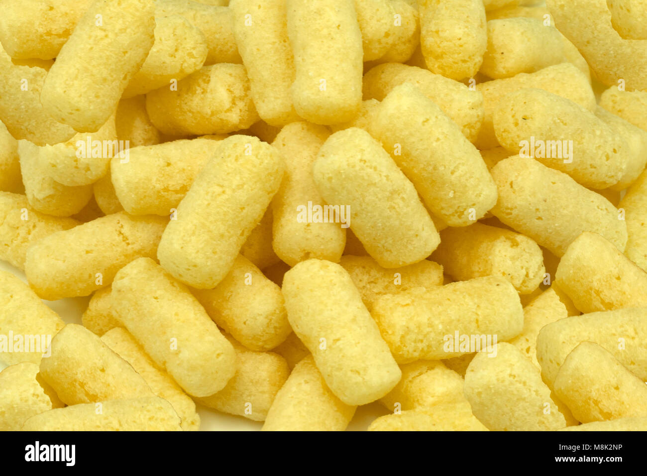 Crunchy corn snacks on white background Stock Photo - Alamy