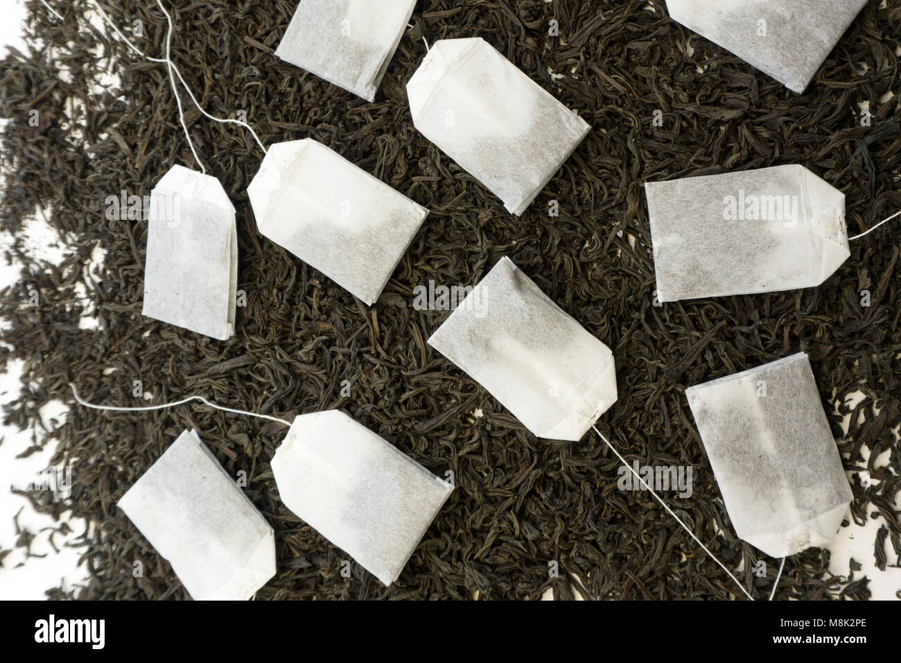 Hanging tea bags in a close-up image Stock Photo - Alamy