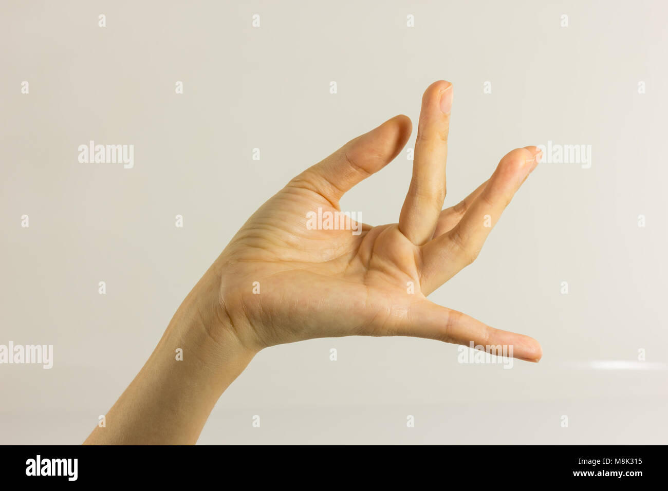 Woman hand Isolated on white Stock Photo - Alamy