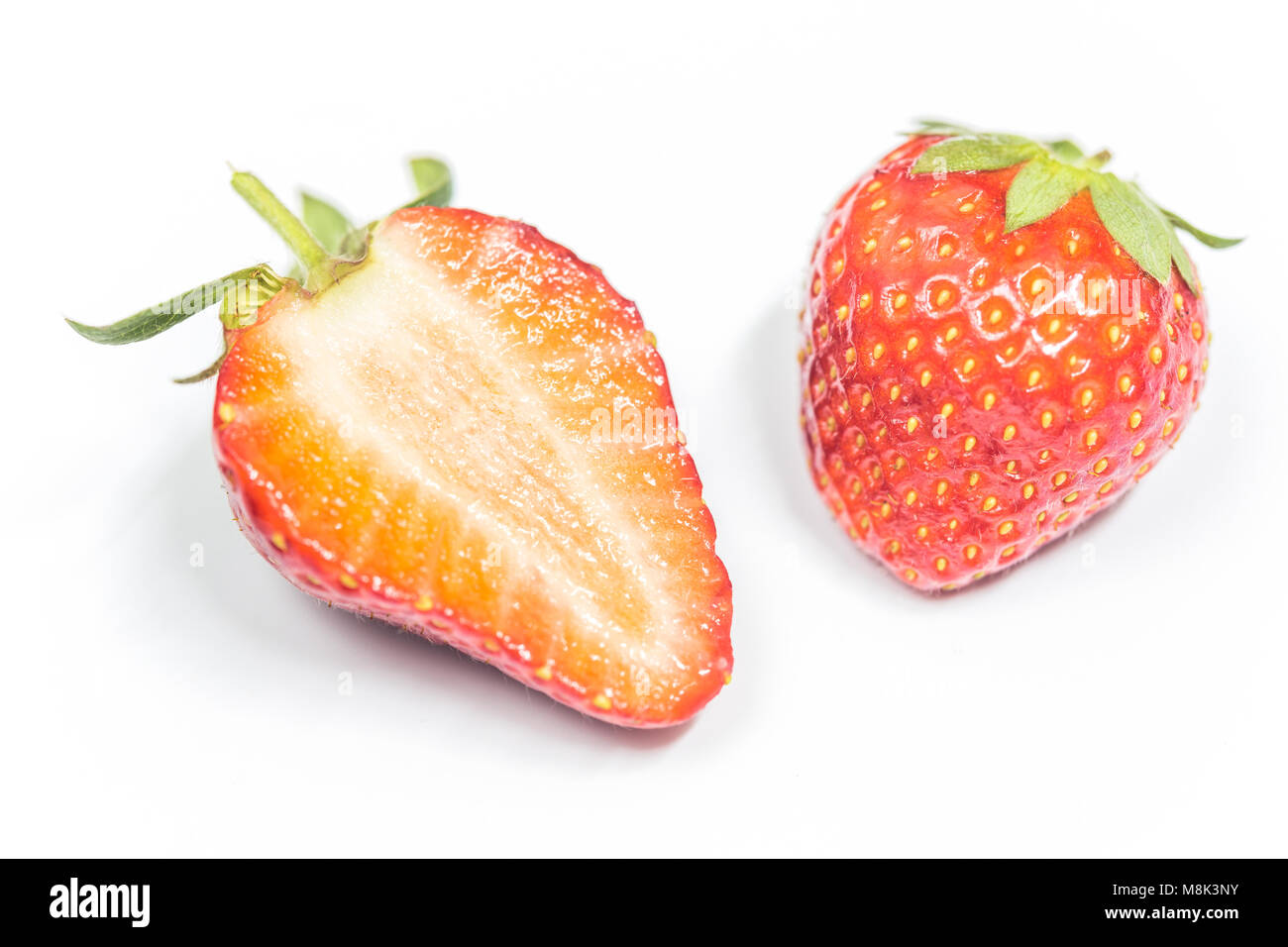 Strawberry cut in half Cut Out Stock Images & Pictures - Alamy