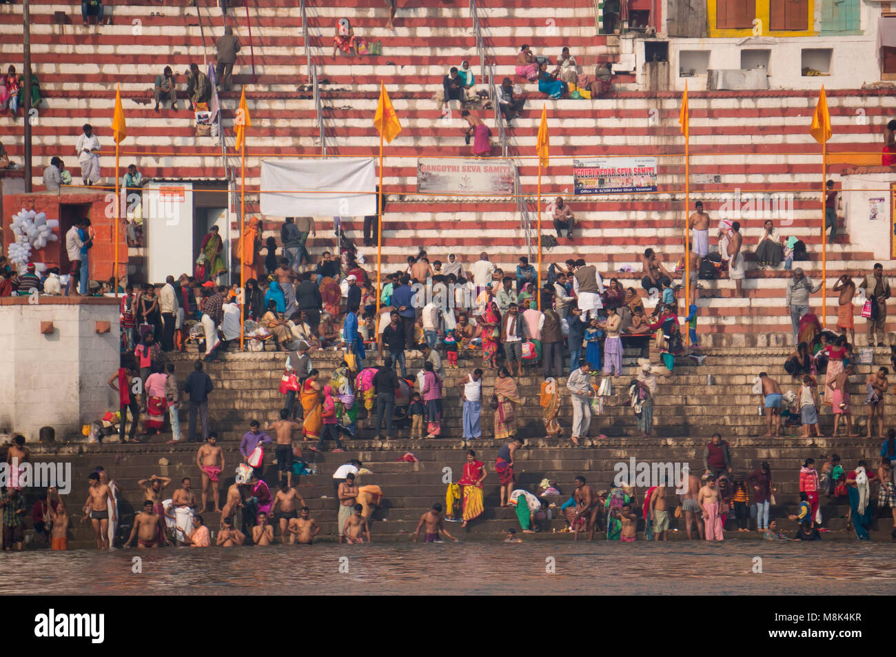VARANASI, INDIA. February 28, 2017: Crowds of people the stairs of the ...