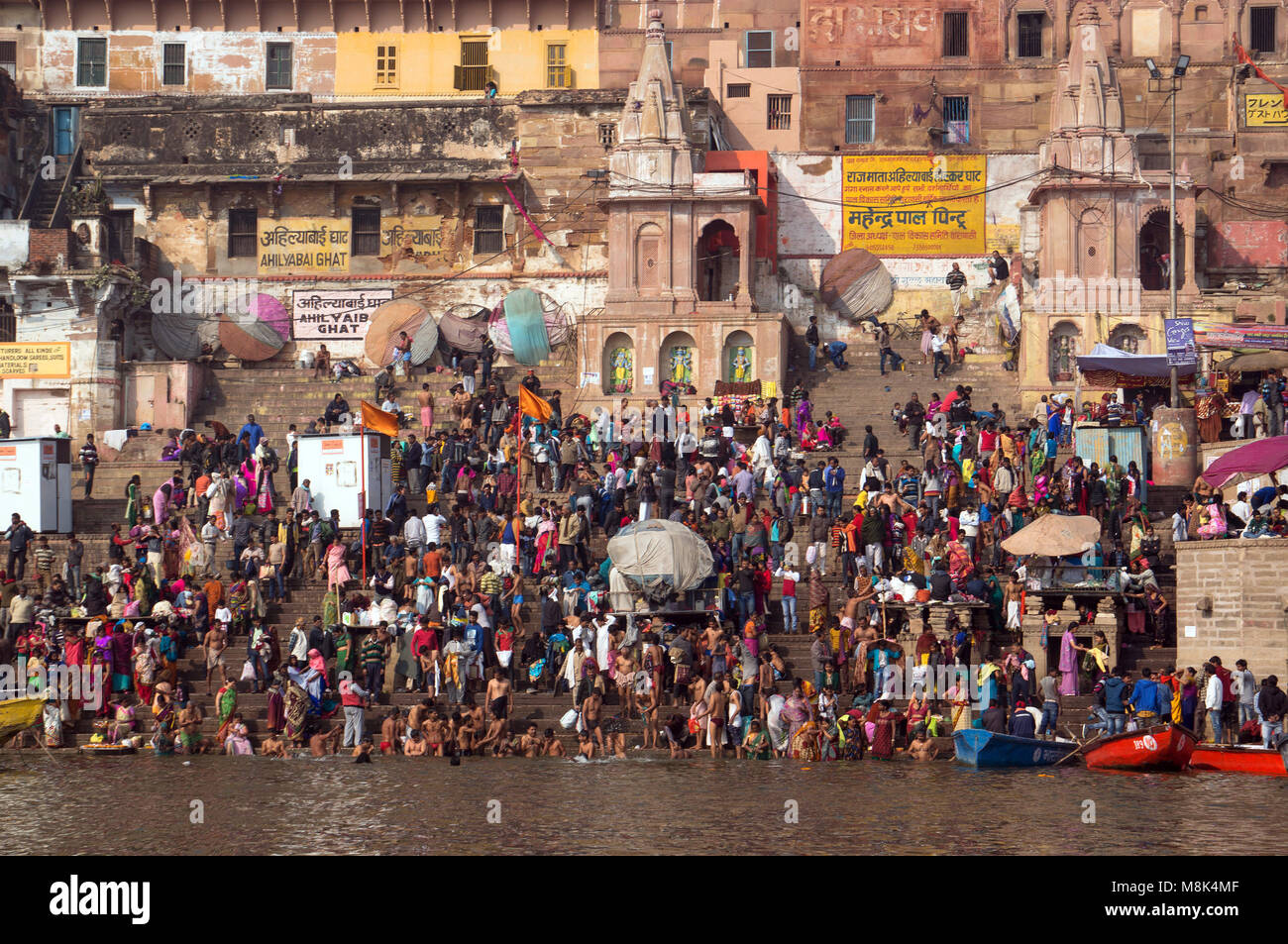 VARANASI, INDIA. February 28, 2017: Crowds of people the stairs of the ...