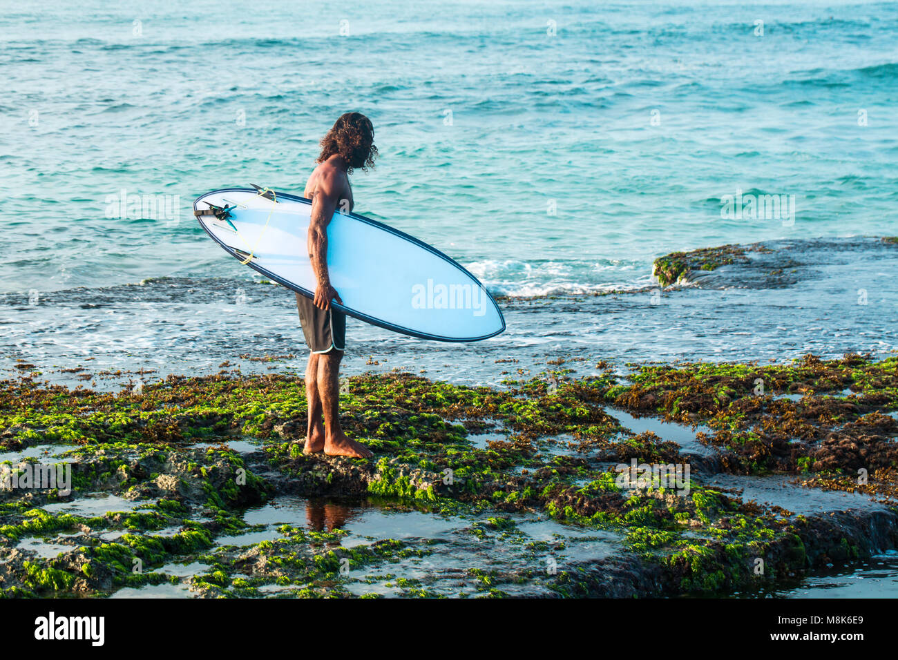 Male surfer long curly hi-res stock photography and images - Alamy