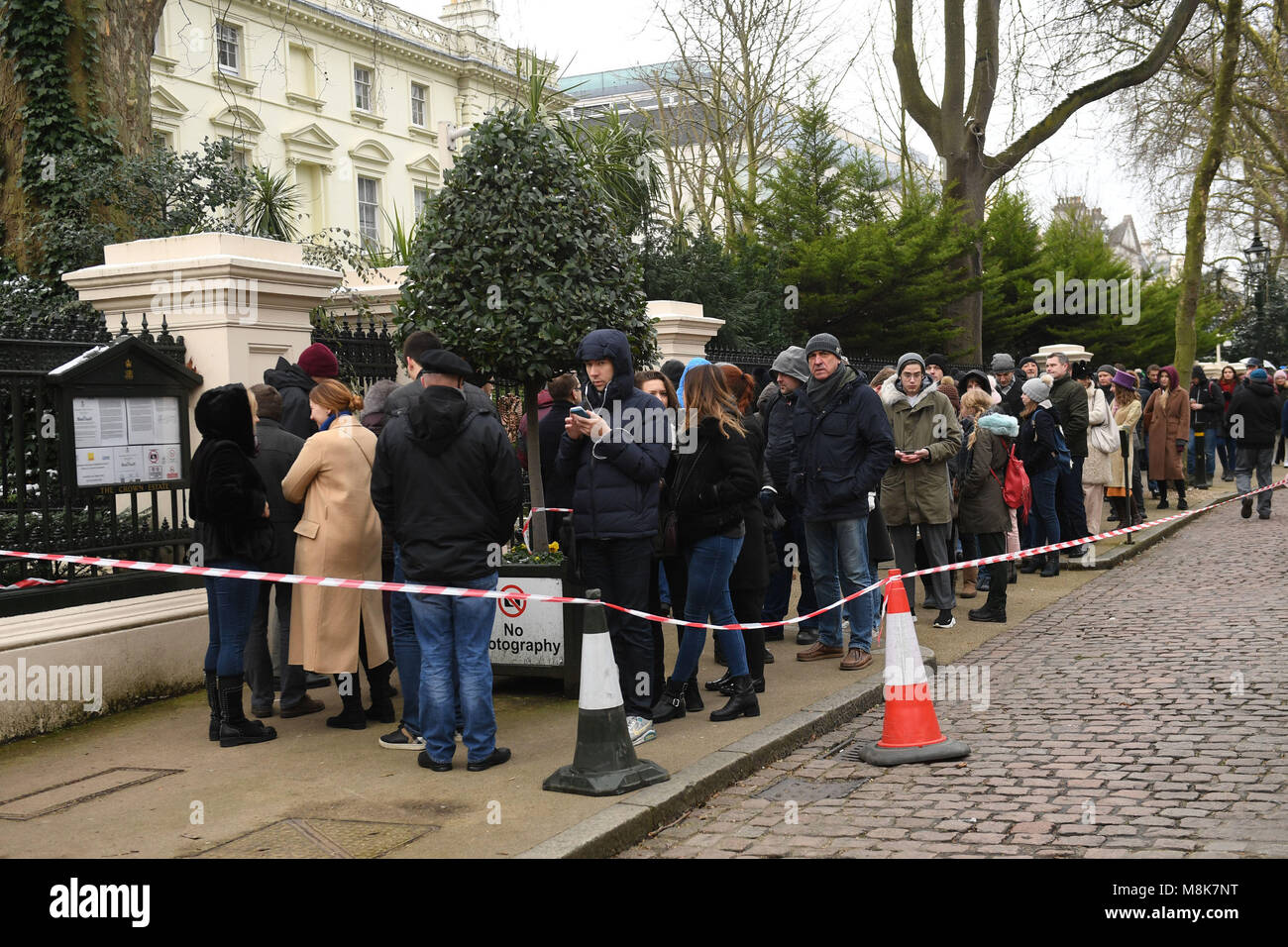 Russian citizens queue outside the Russian embassy in London on the day ...