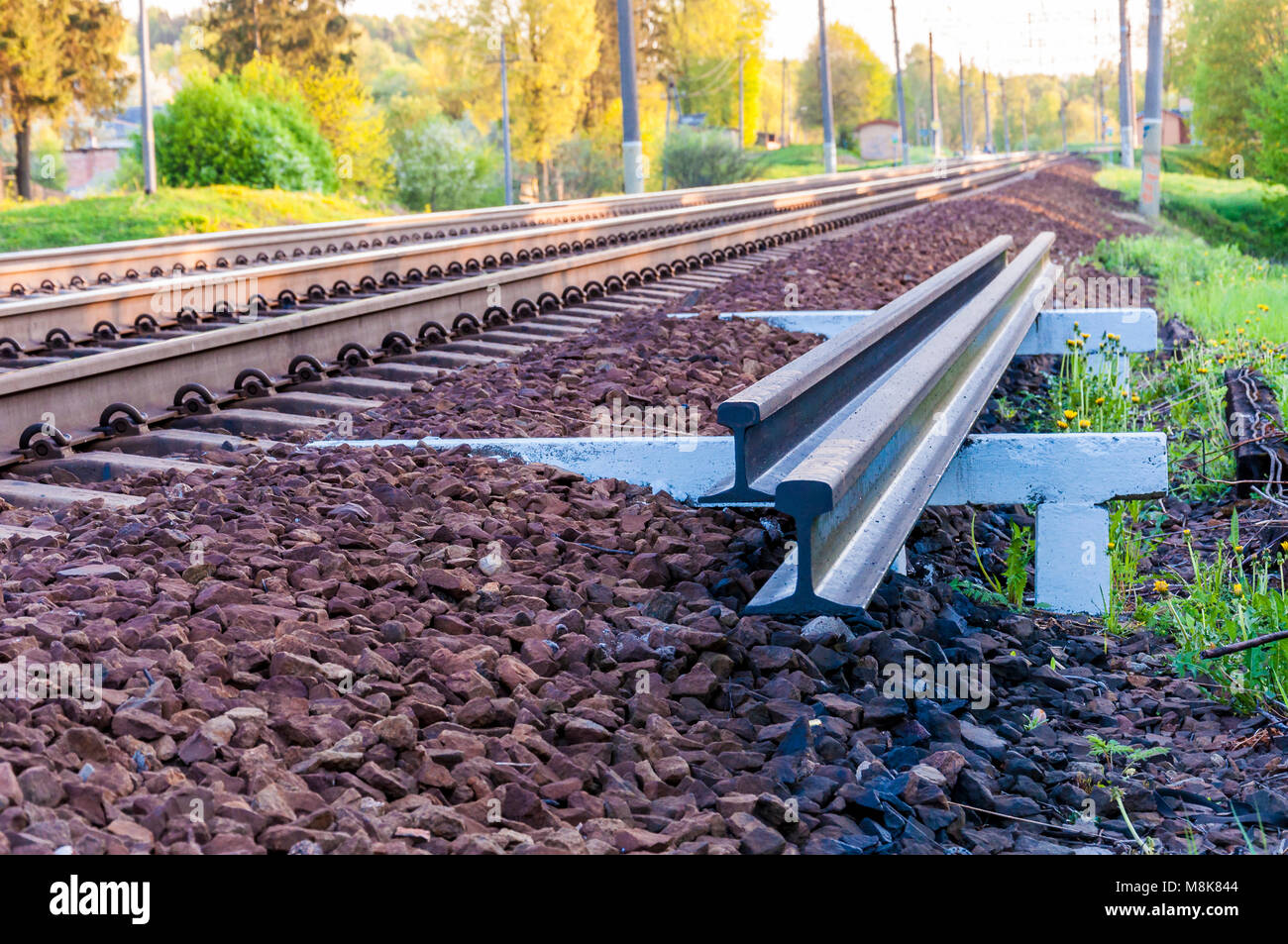 New rails lying aside from railway in Vilnius, Lithuania Stock Photo ...