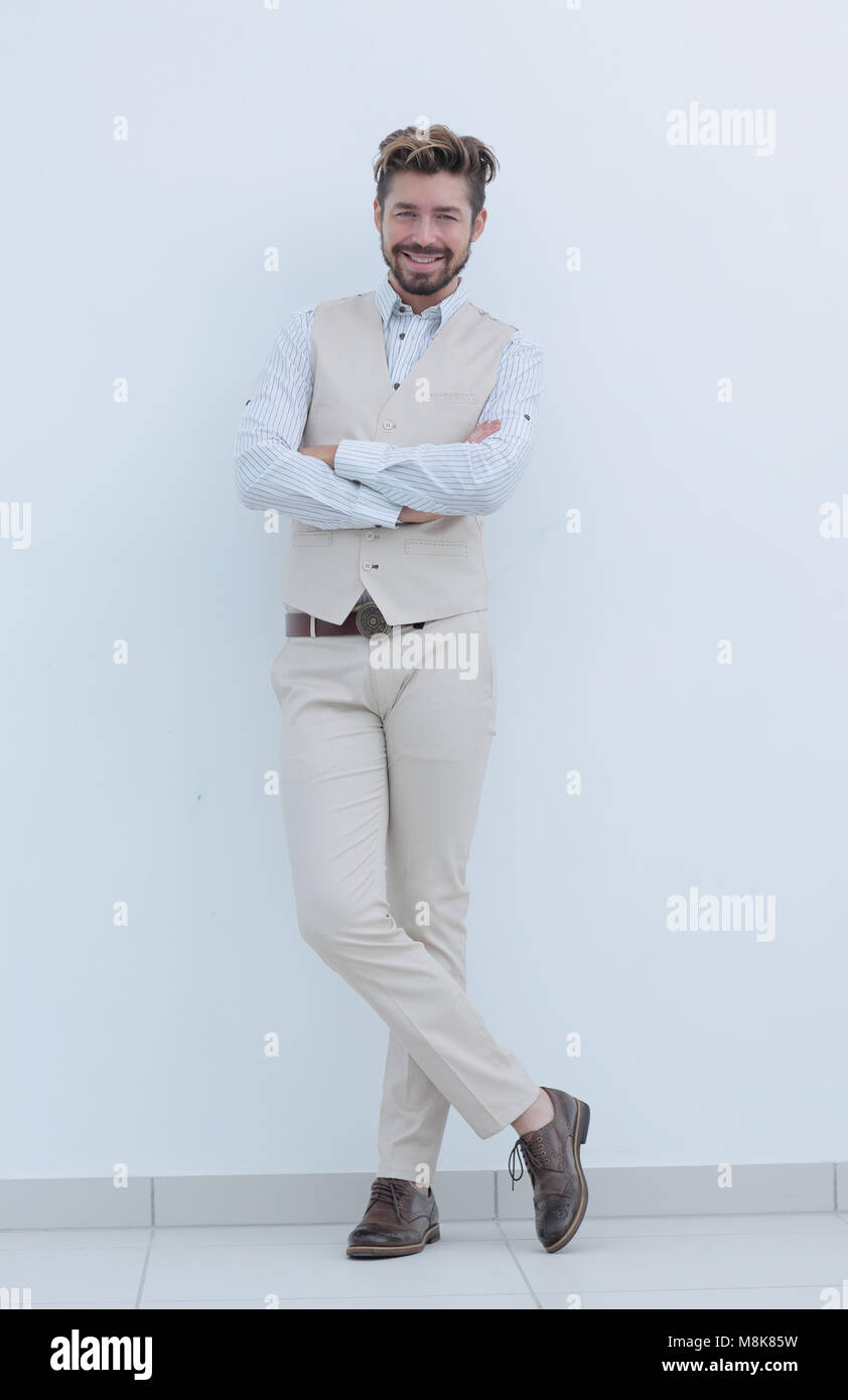 Full length portrait of stylish man with crossed hands Stock Photo - Alamy