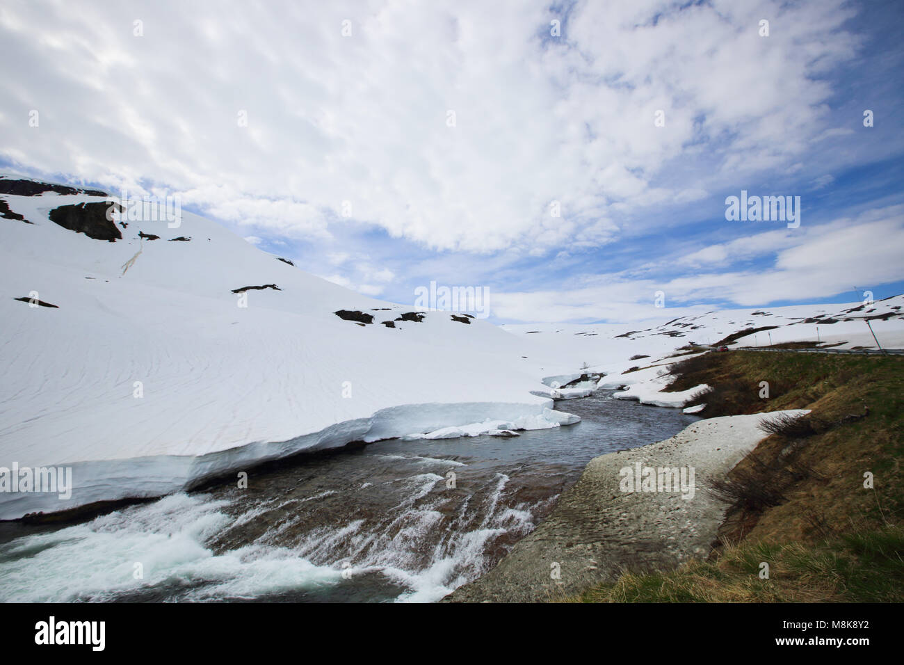 Spring glacial river of melting snow in mountains of Norway Stock Photo ...
