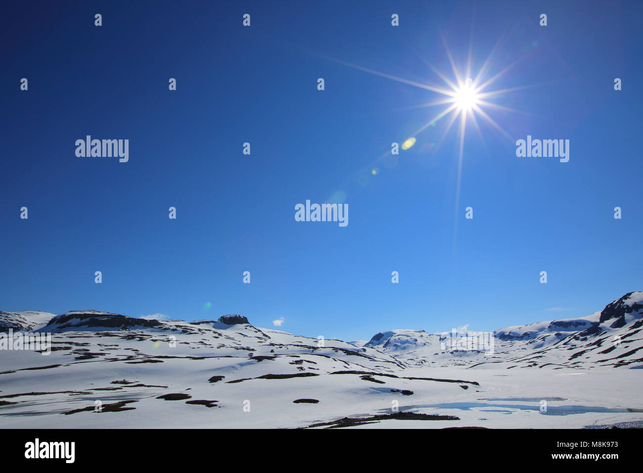 Spring valley landscape with mountains and melting snow, Norway Stock ...