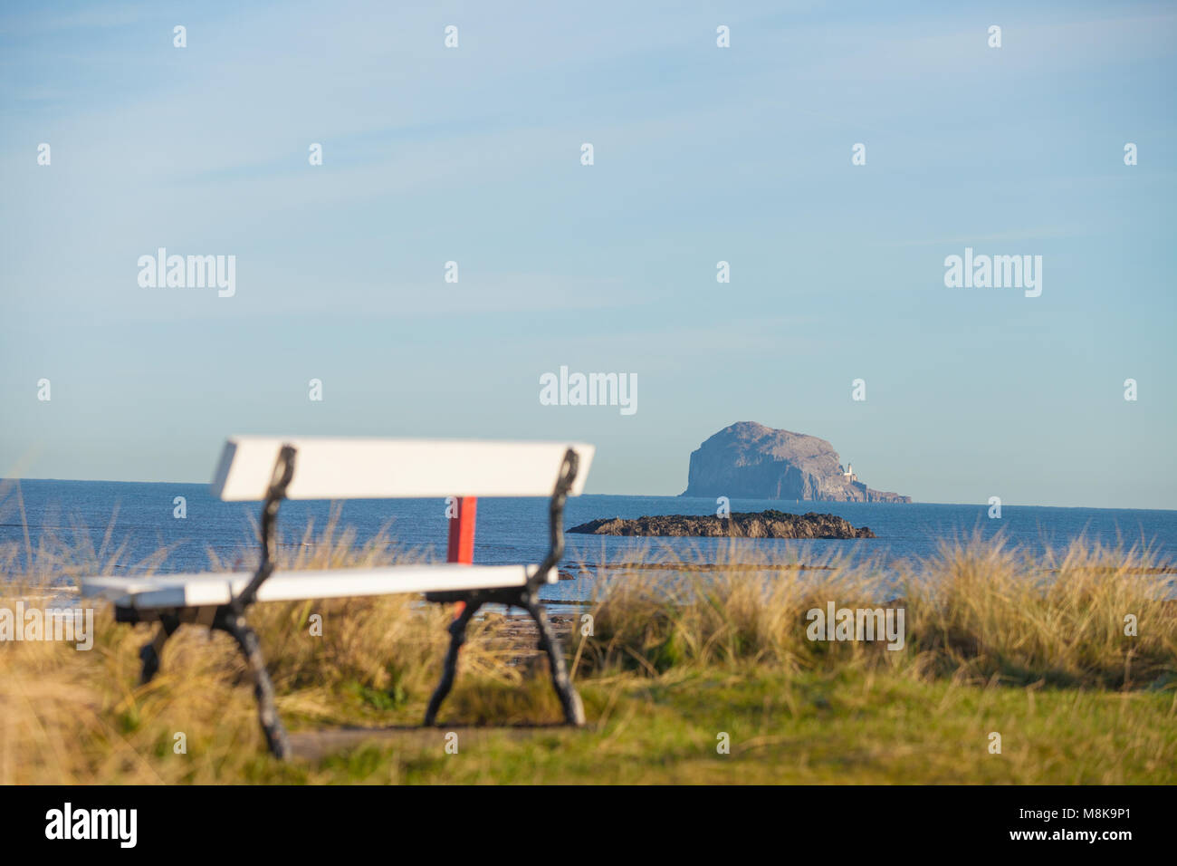 A bench with views of the Bass Rock at North Berwick Beach Scotland ...