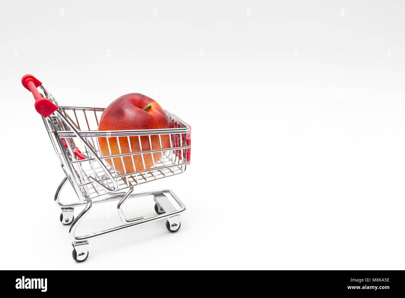 Buying a nectarines from supermarket, Nectarine in shopping cart ...