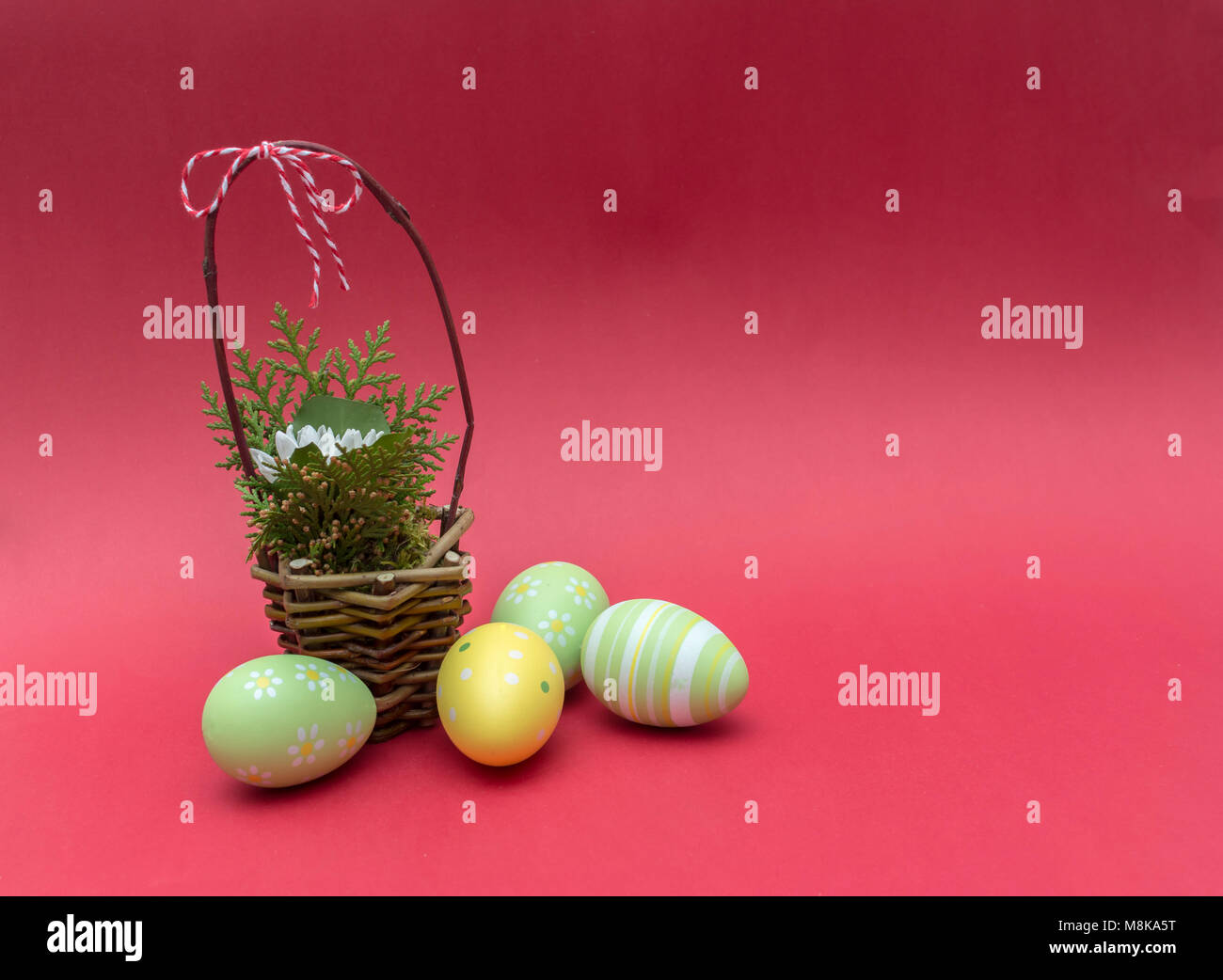Basket with snowdrops, martisor. Easter eggs, cord white and red ...