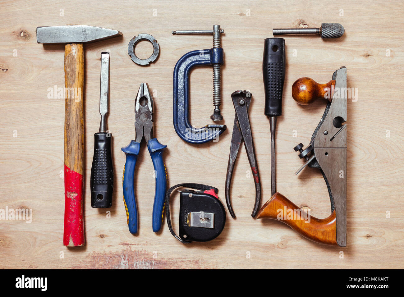 Composition of old carpenter tools on the wood table Stock Photo - Alamy