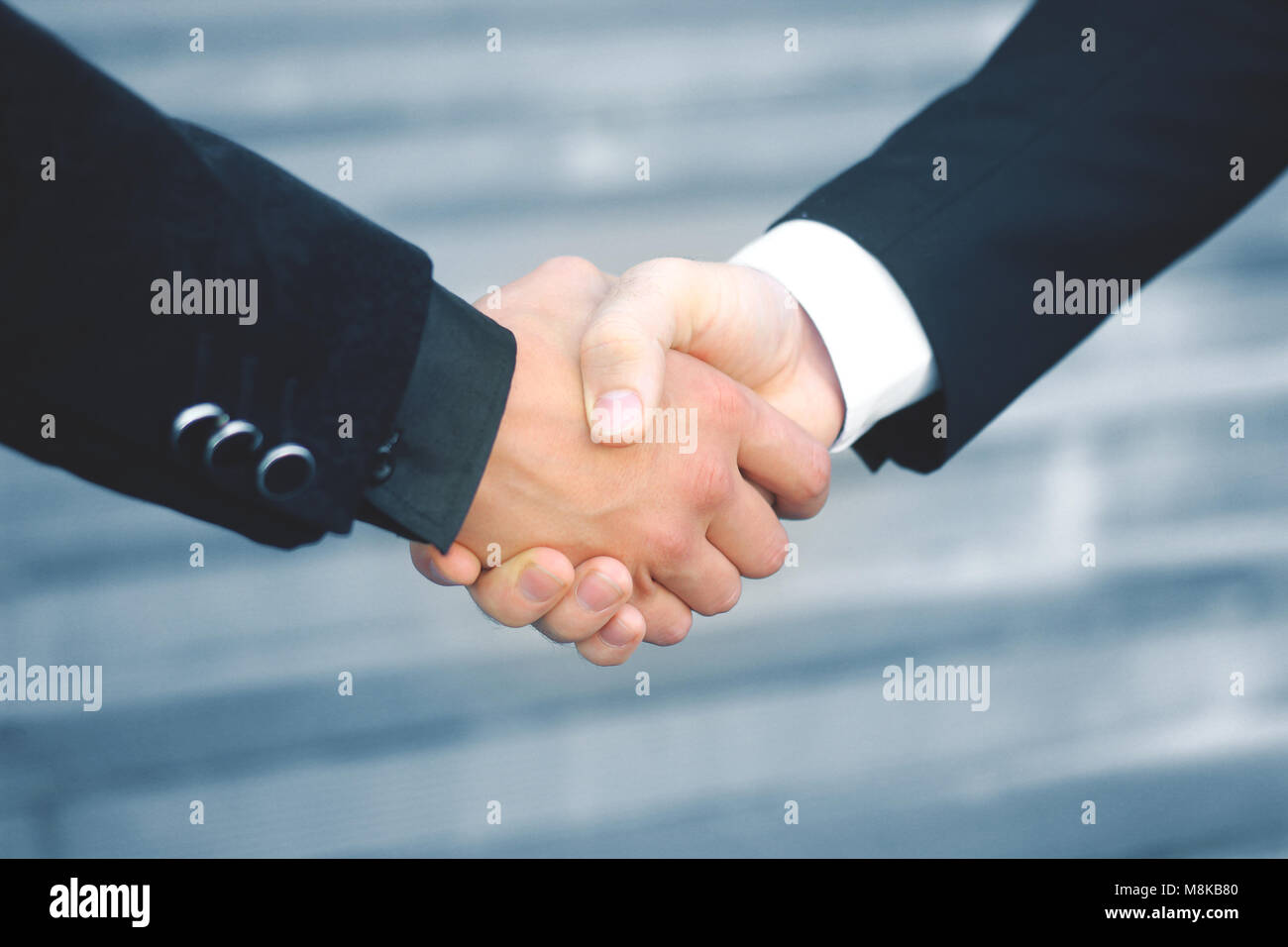 Handshake background hi-res stock photography and images - Alamy