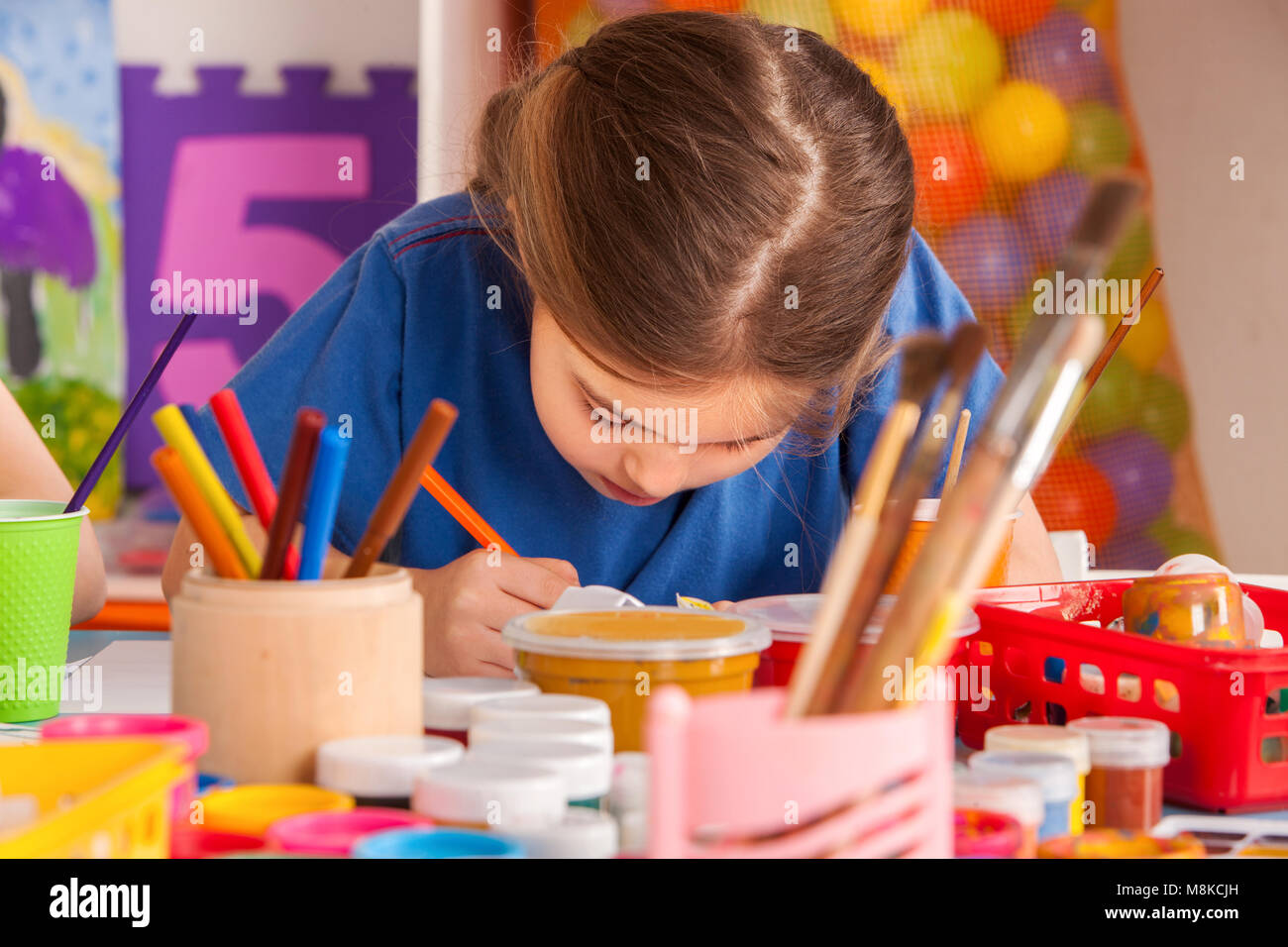 Small students children painting in art school class Stock Photo - Alamy