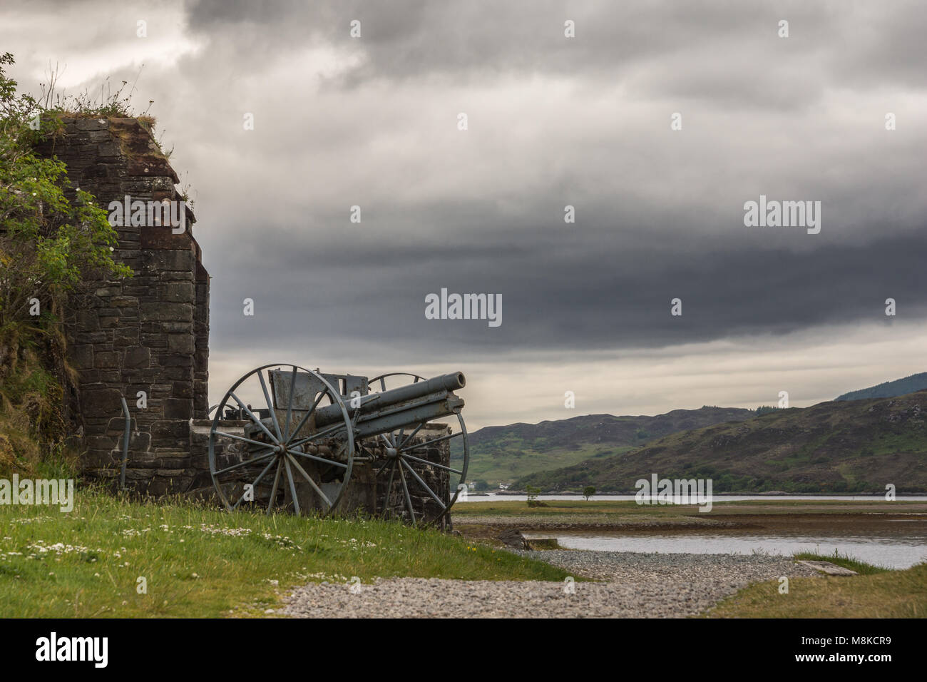 Dornie, Scotland - June 10, 2012: Historic artillery piece outside wall ...