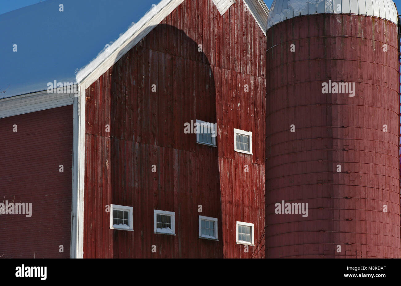 close up of a red barn with a cylo in the front in New Hampshire Stock ...