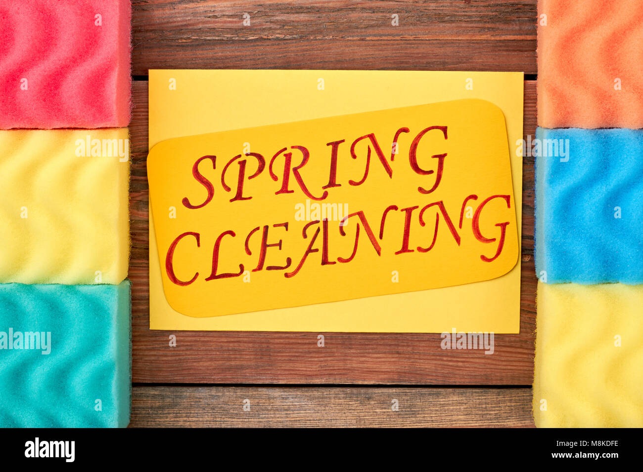 Frame from kitchen sponges on wooden background Stock Photo - Alamy