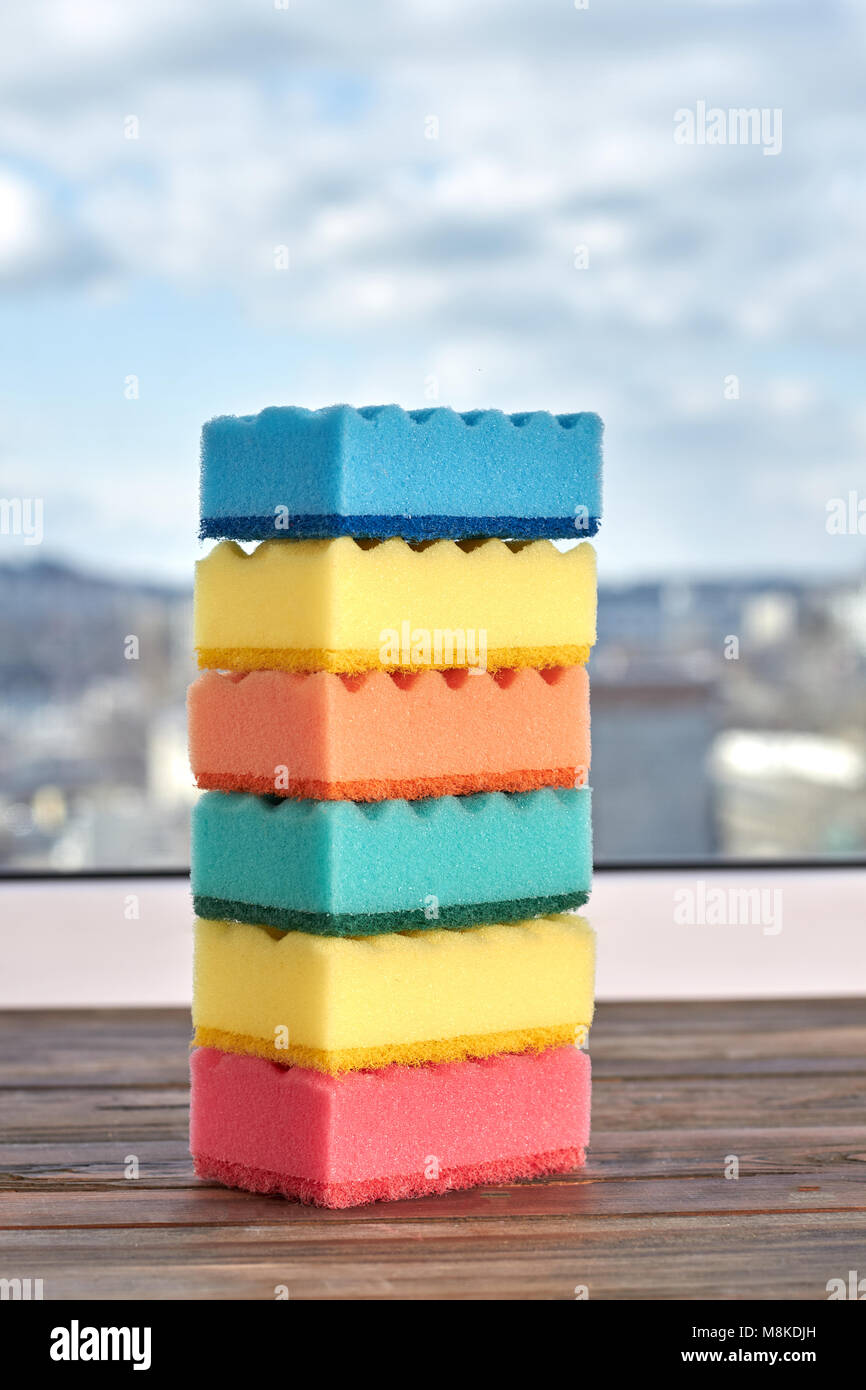 Stack of multicolored kitchen sponges Stock Photo - Alamy