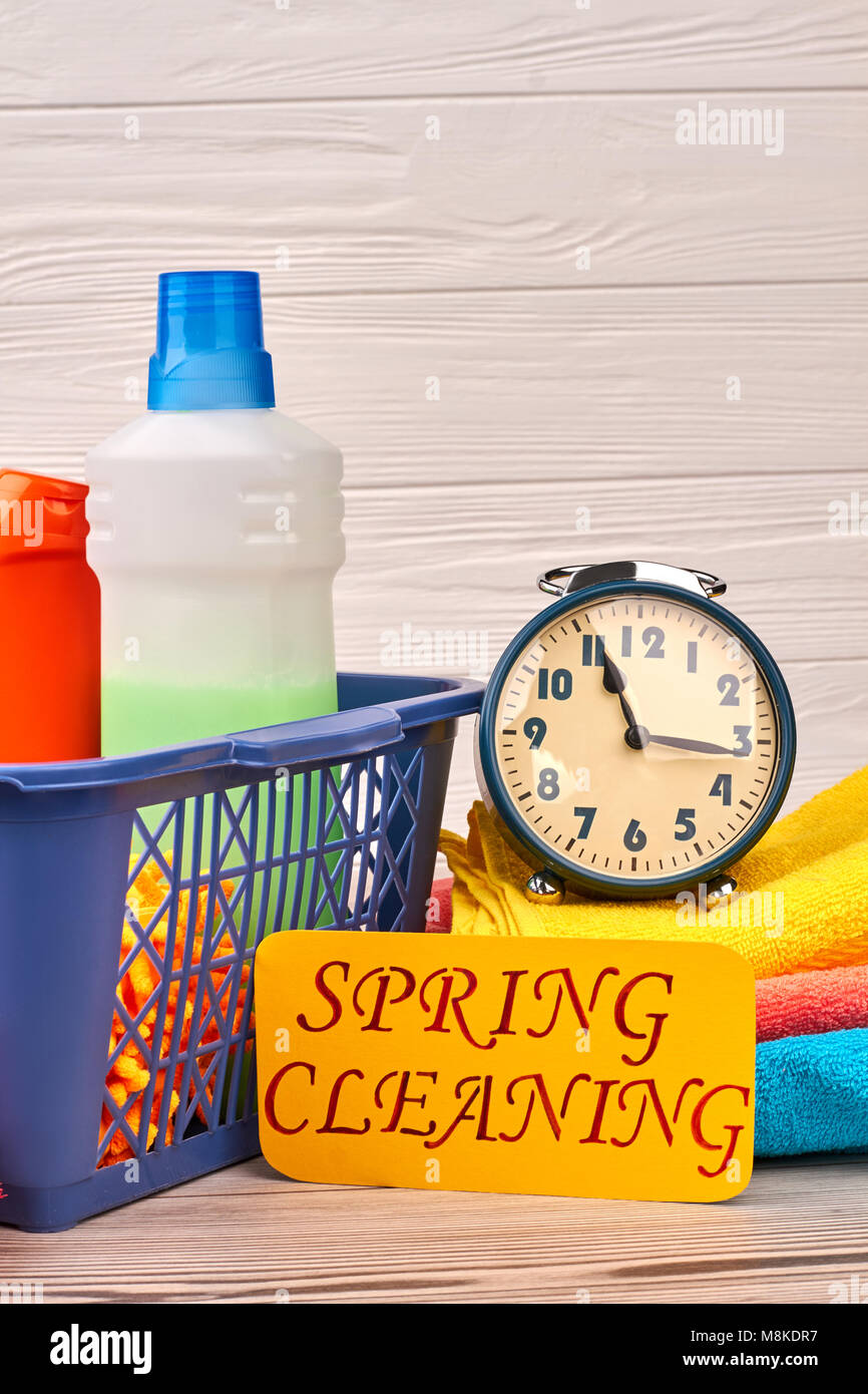 Household cleaning products and alarm clock Stock Photo - Alamy